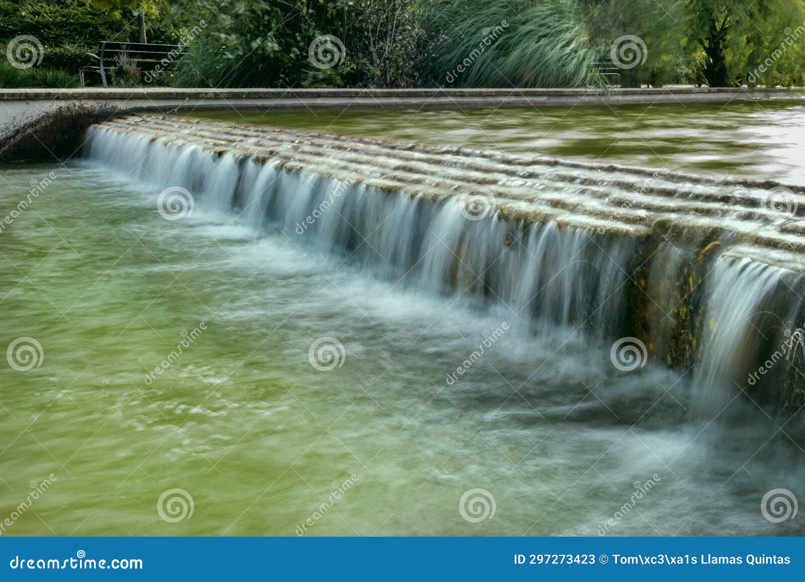 Long Exposure Image of a Small Slope with Water Falling into a Canal in ...