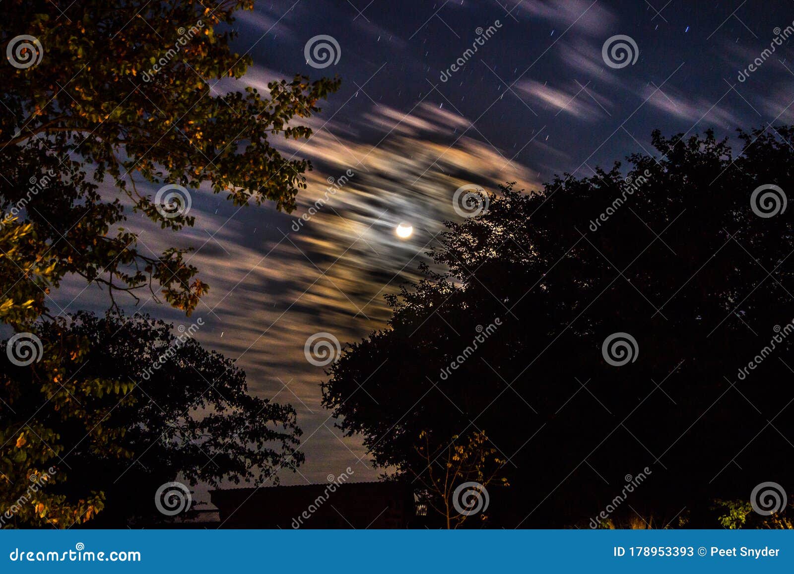 Long Exposure of Moon and Clouds with Stars Stock Image - Image of long ...