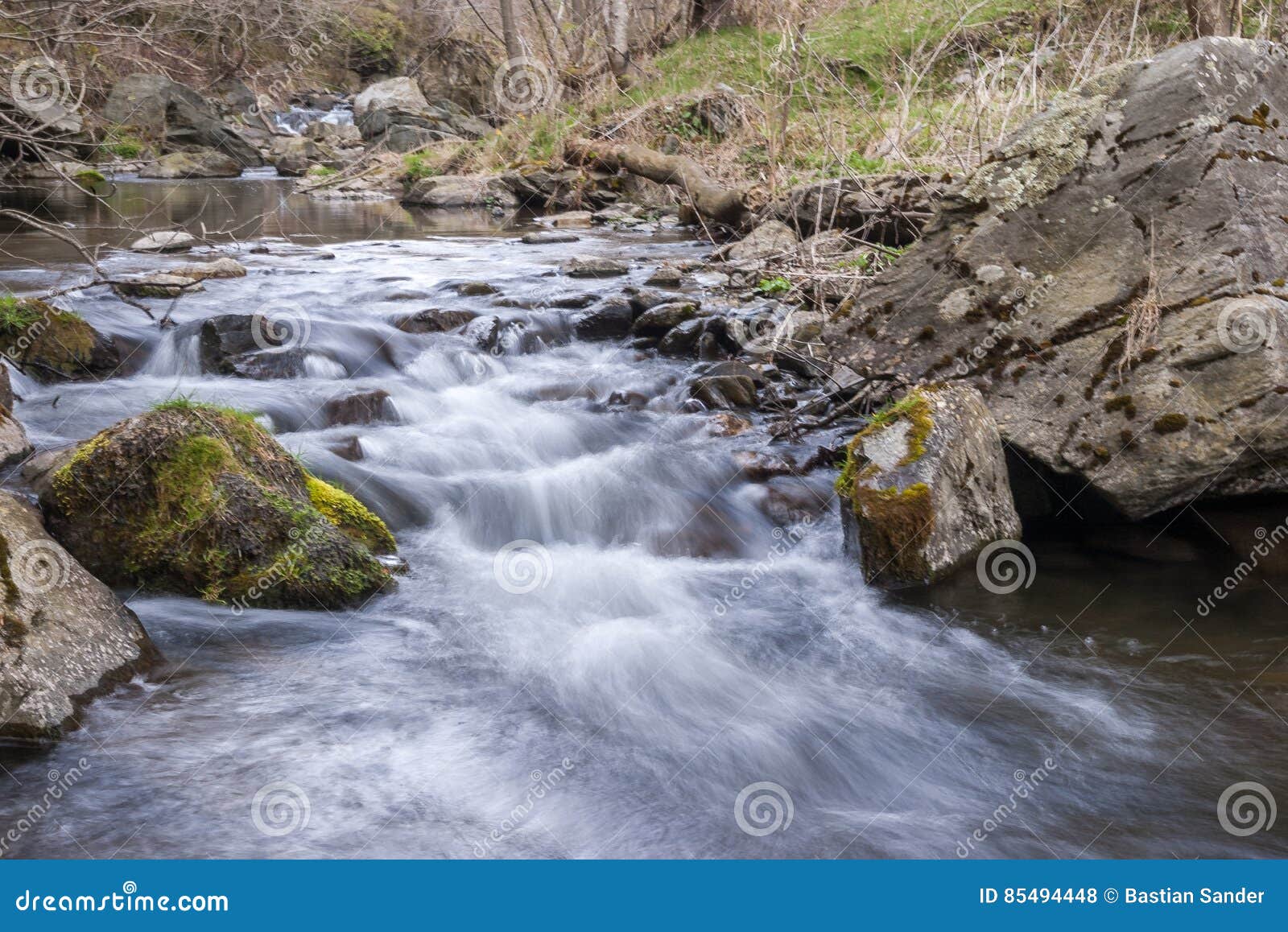 Long Exposure of Rapids of a Small Stream during Winter Stock Photo ...