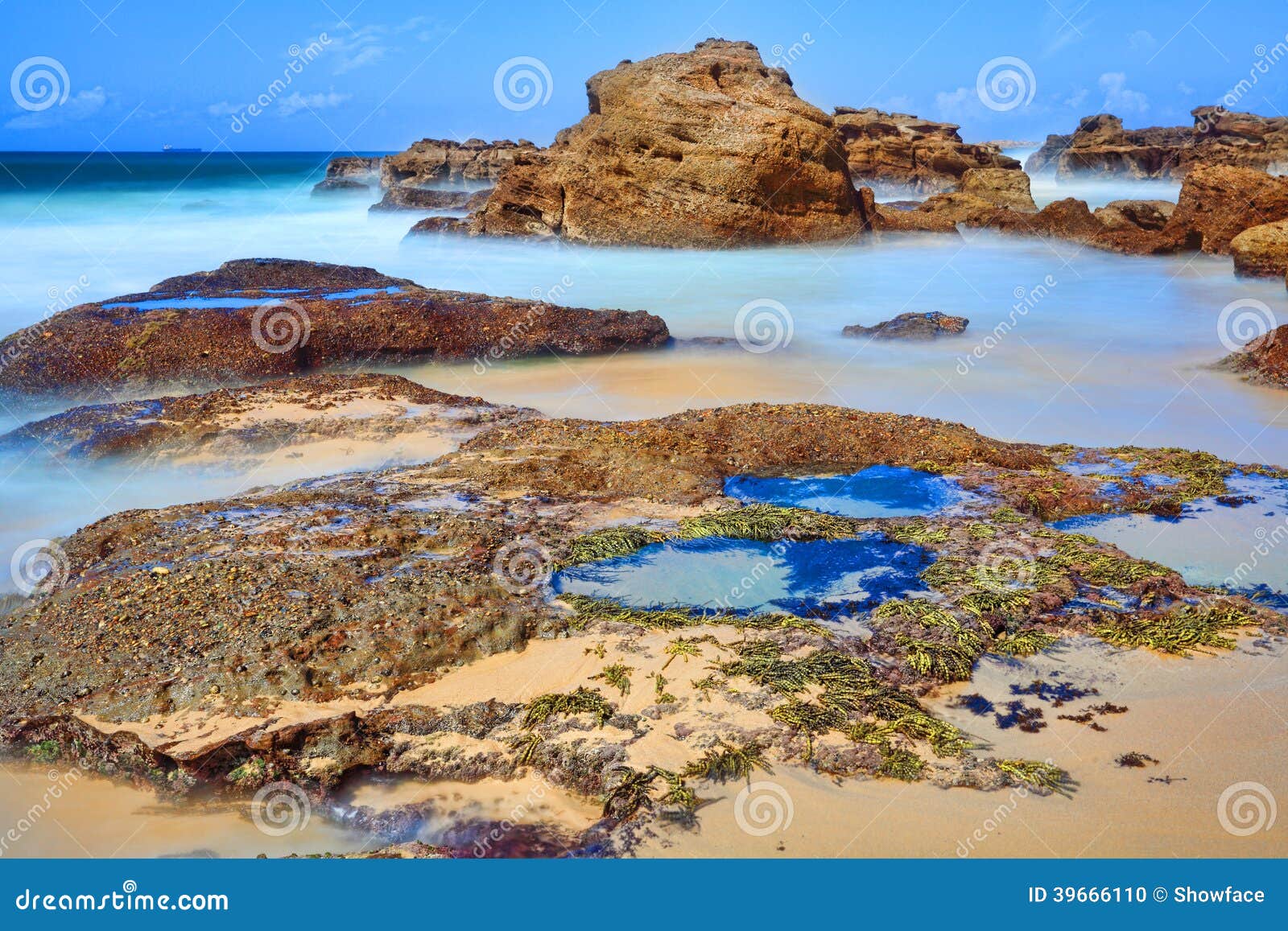 Long Exposure Rocks and Rock Pools at Low Tide Stock Photo - Image of ...