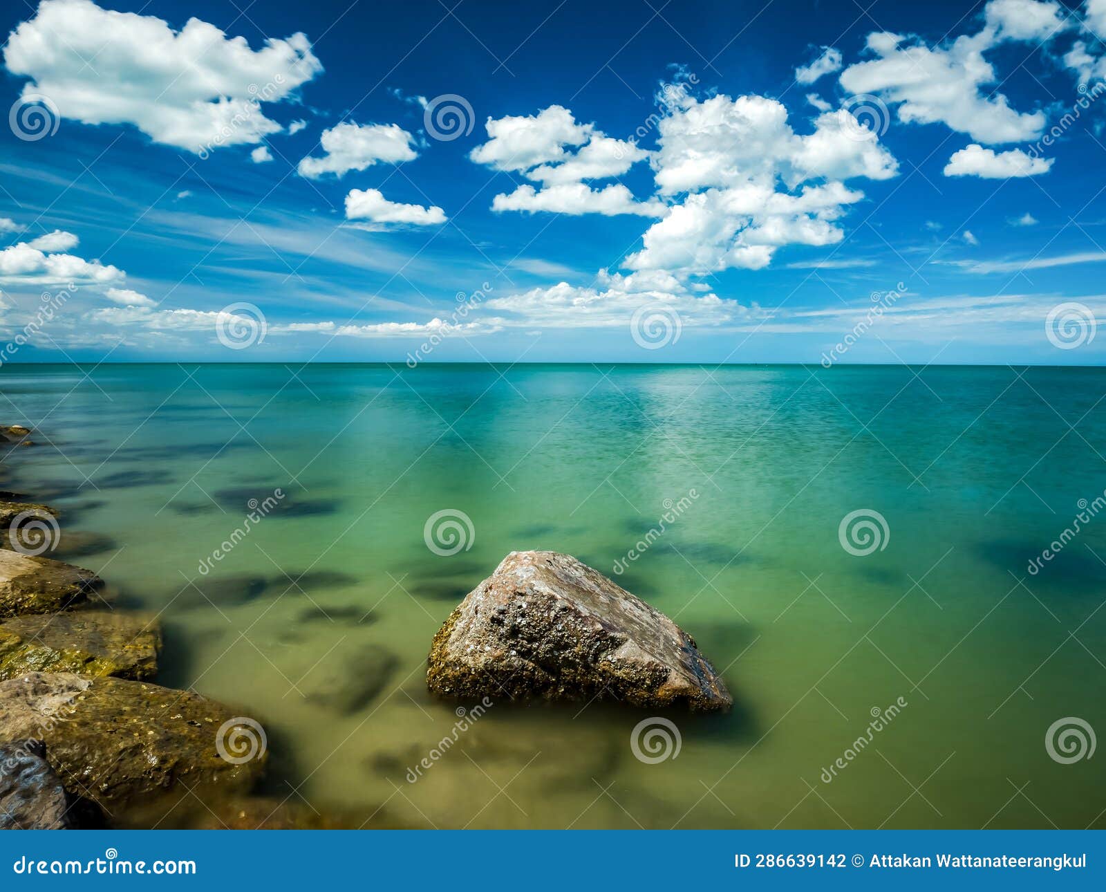 Long Exposure Shot of a Beautiful Sea and Sky on Summer Stock Photo ...
