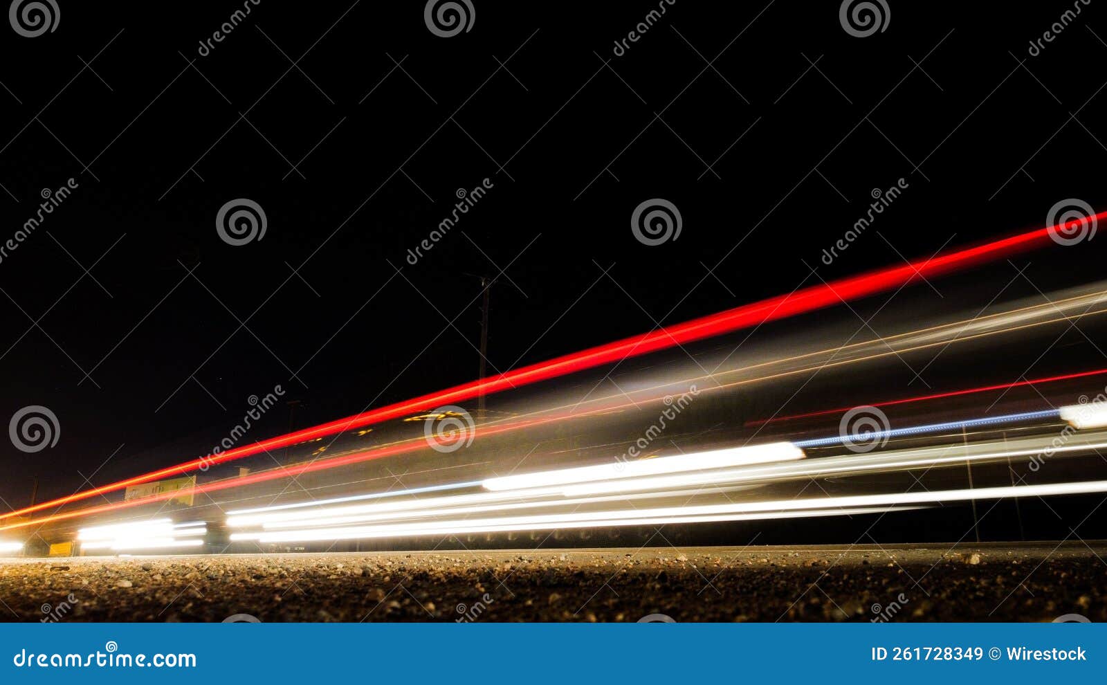 Long Exposure Shot of Car Headlights on a Dark Road Stock Image - Image ...