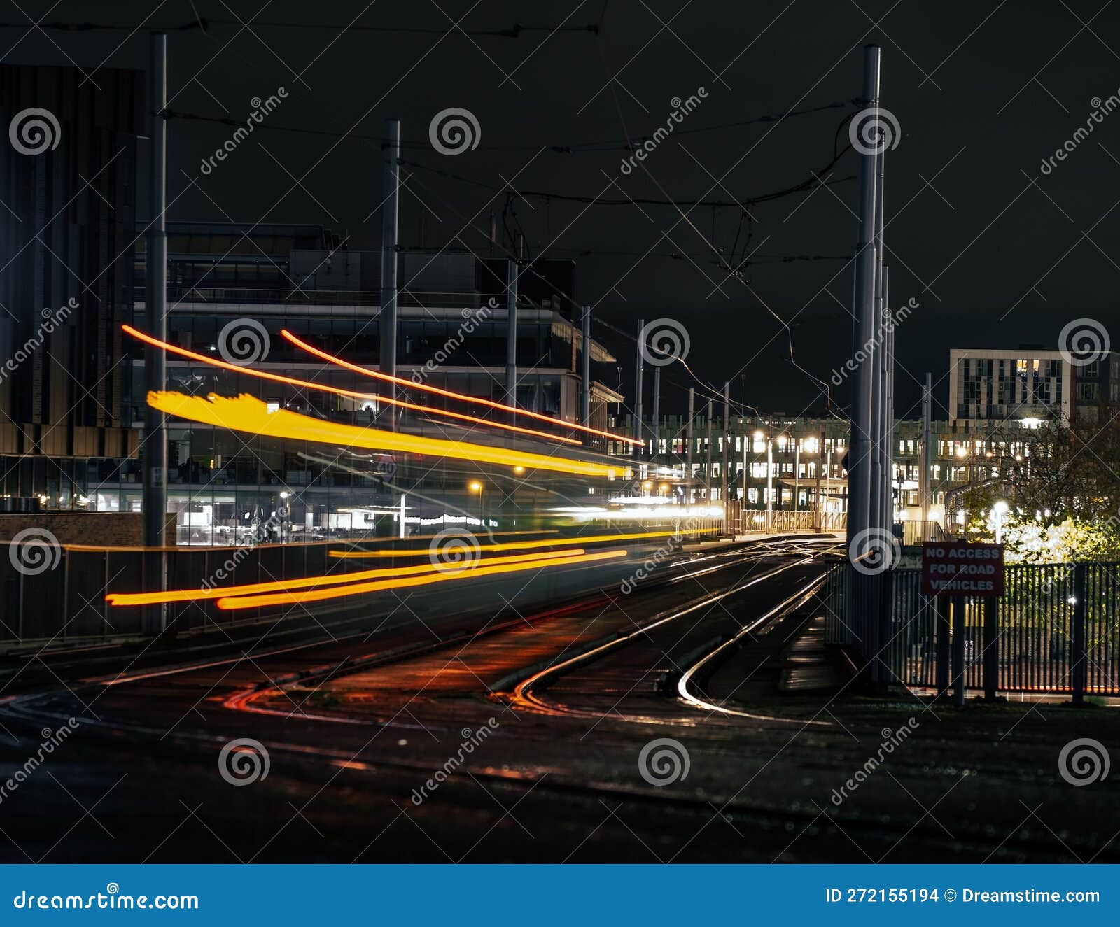 Long Exposure Shot of the Light Trails of the Train Over the Railway ...