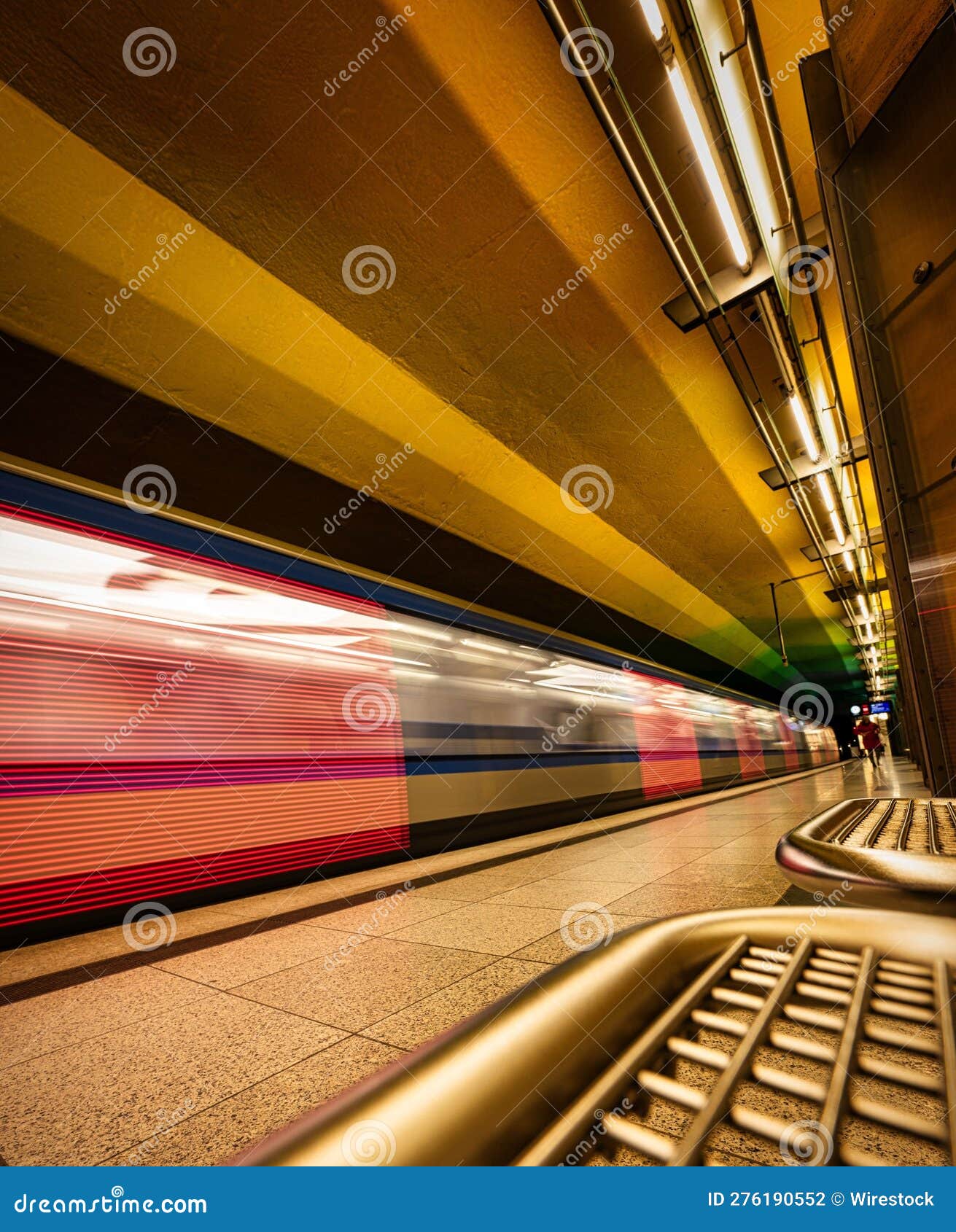 Long Exposure Shot of a Train in Motion Along an Empty Railway Platform ...
