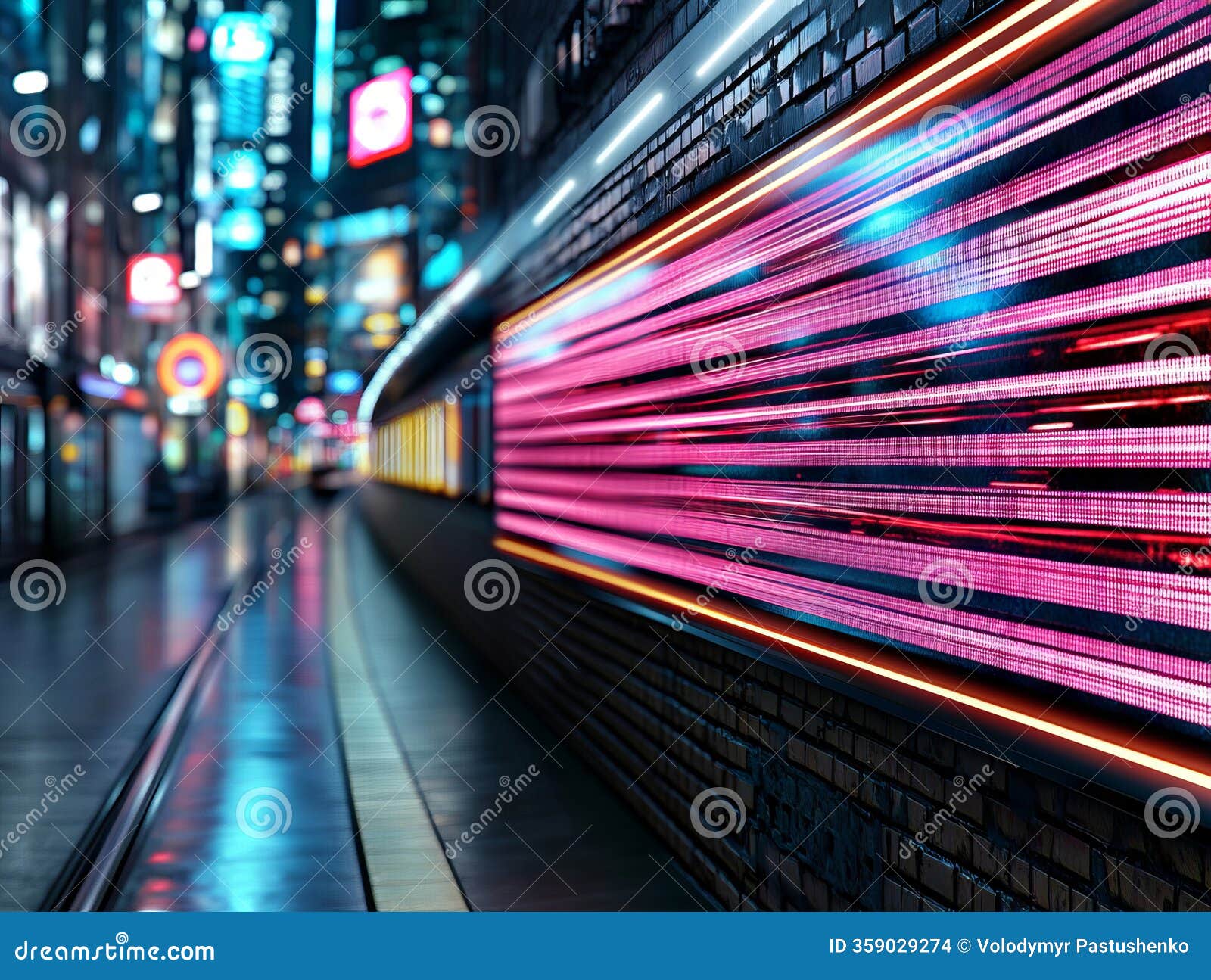 A Long Exposure Shot of a Train Passing through a City at Night Stock ...