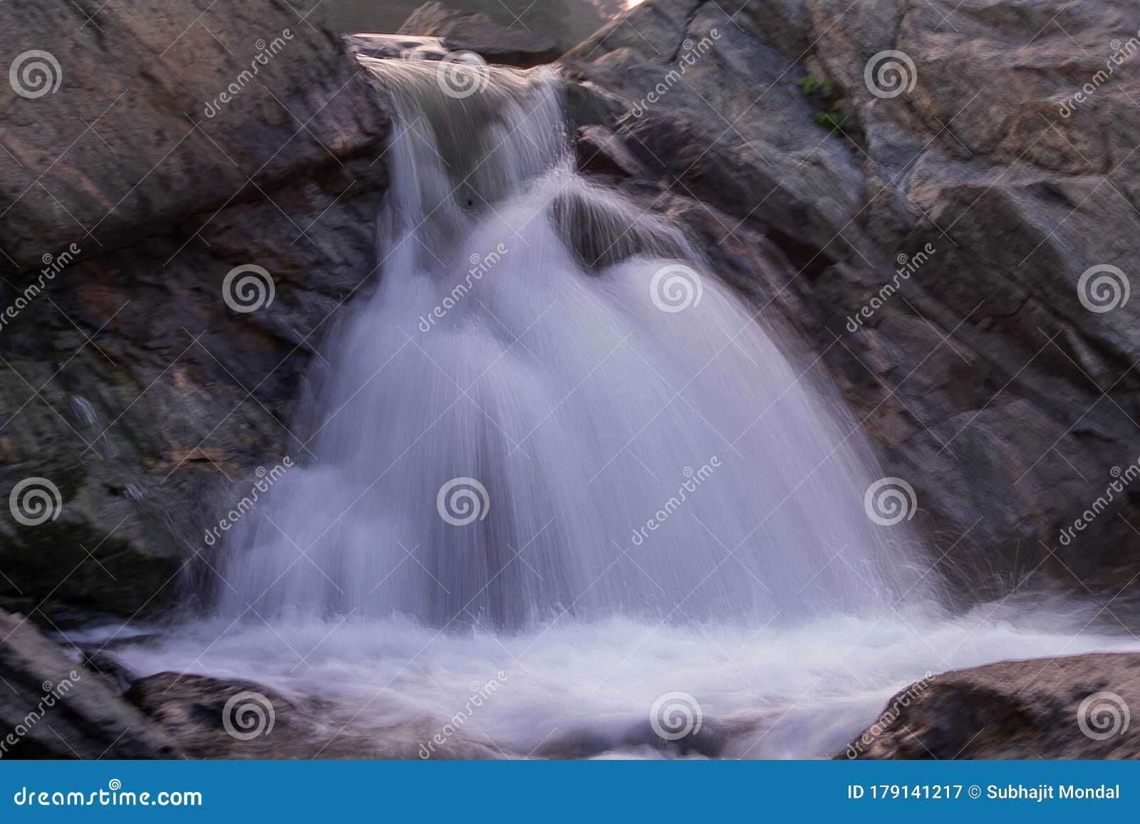 Long Exposure Shot of a Waterfall Falling Down between the Rocks Stock ...