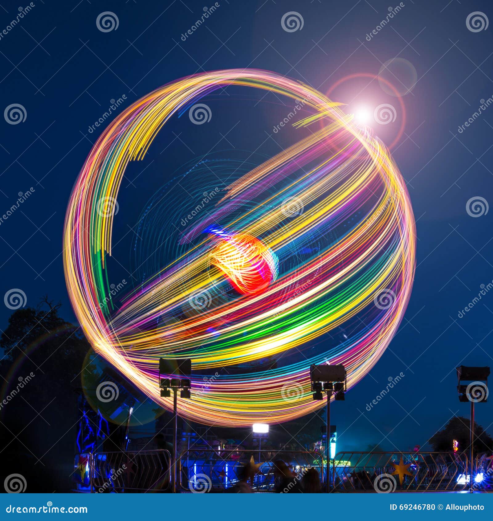 Long Exposure of a Spinning Fairground Ride Stock Photo - Image of ...