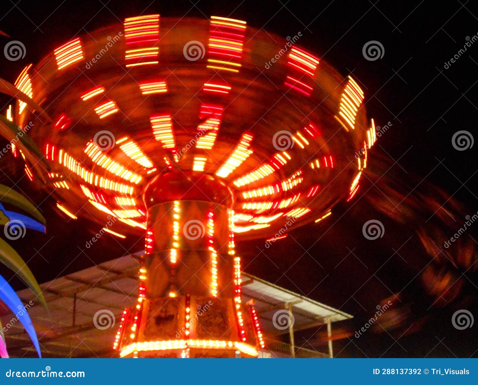 Long Exposure of a Swing Ride at Night Stock Photo - Image of light ...