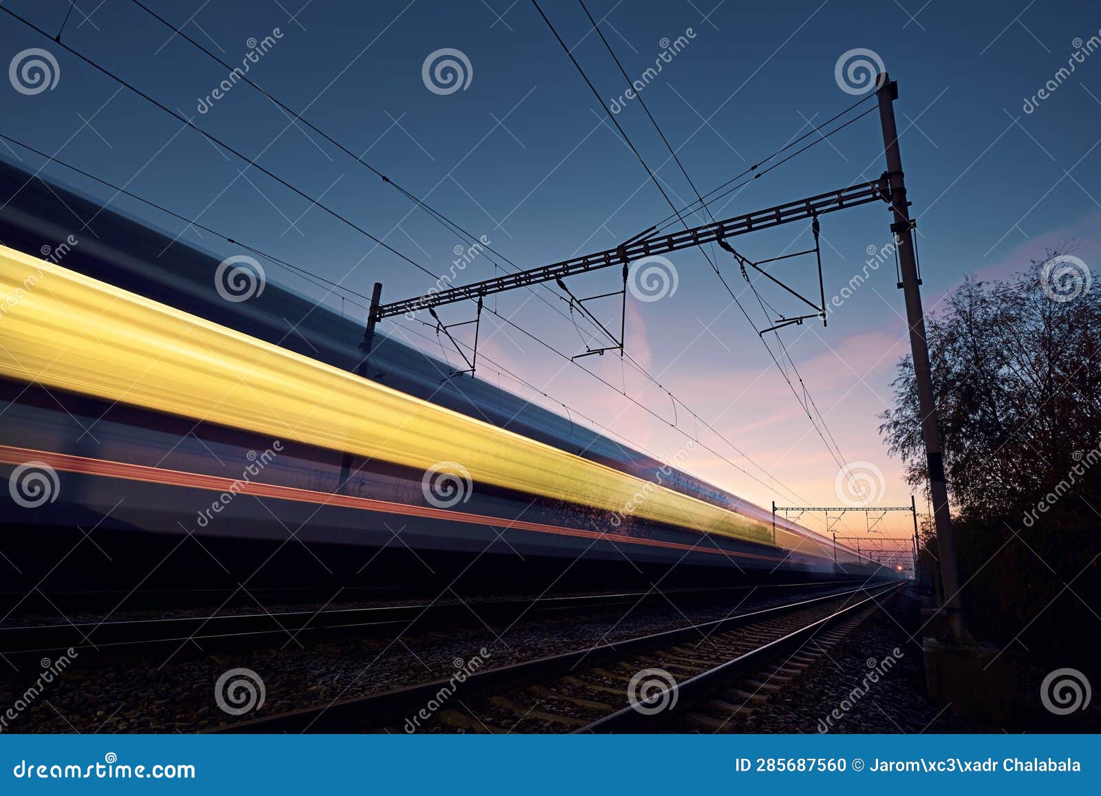 Long Exposure of Train on Railroad Track at Sunrise Stock Photo - Image ...