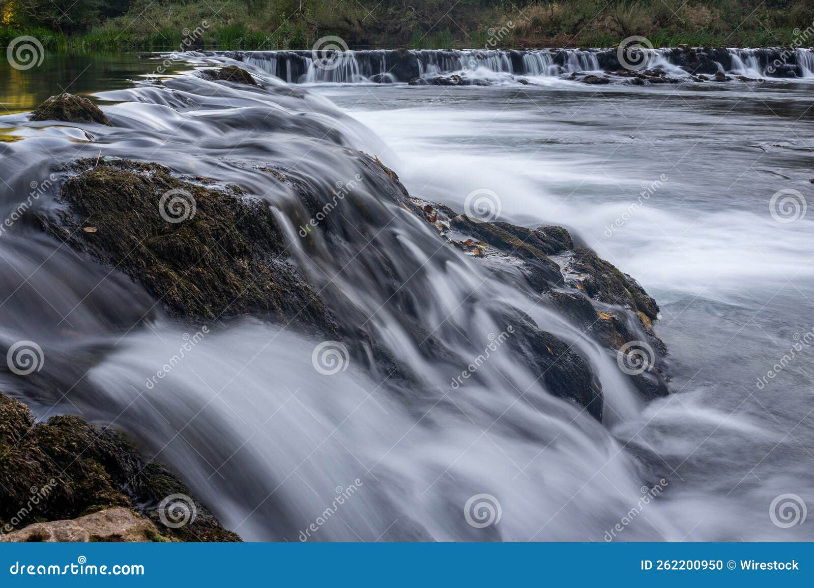 Long Exposure of the Water Sliding through the Rocks on a Dum Stock ...