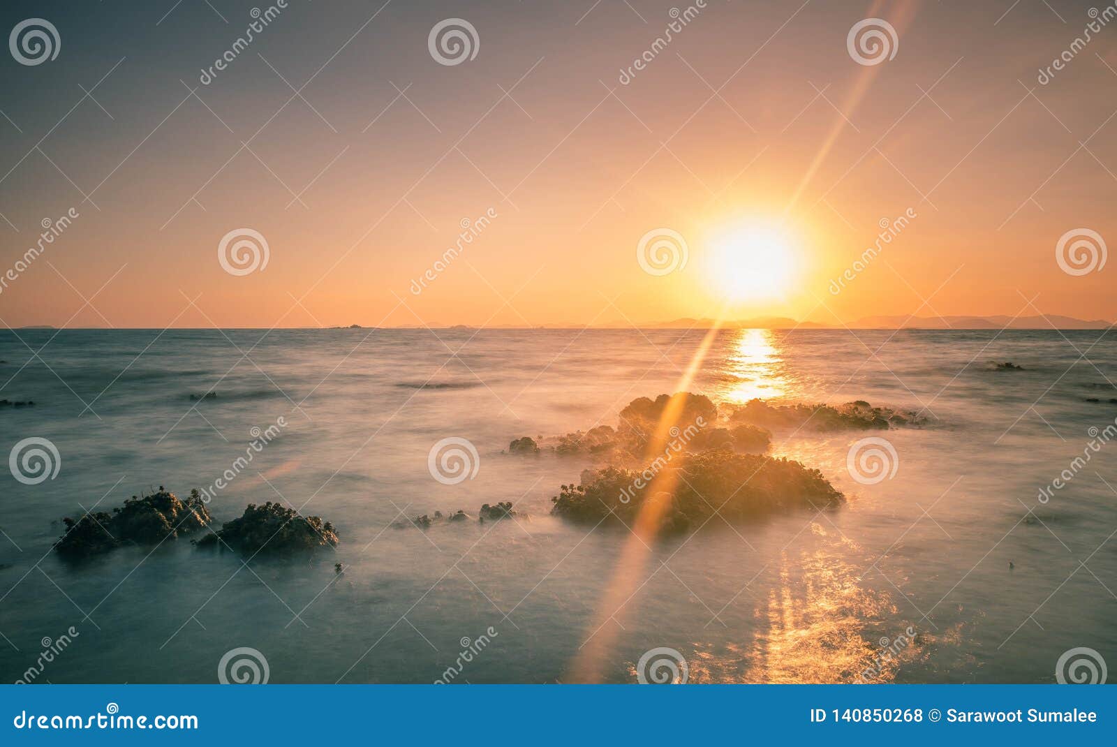 The Long Exposure of the Waves and the Sun Ray Over the Surface of the ...