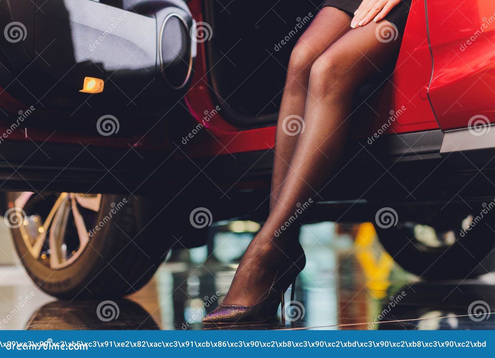 Long Female Legs on a Steering Wheel of a Car. Stock Image - Image of ...