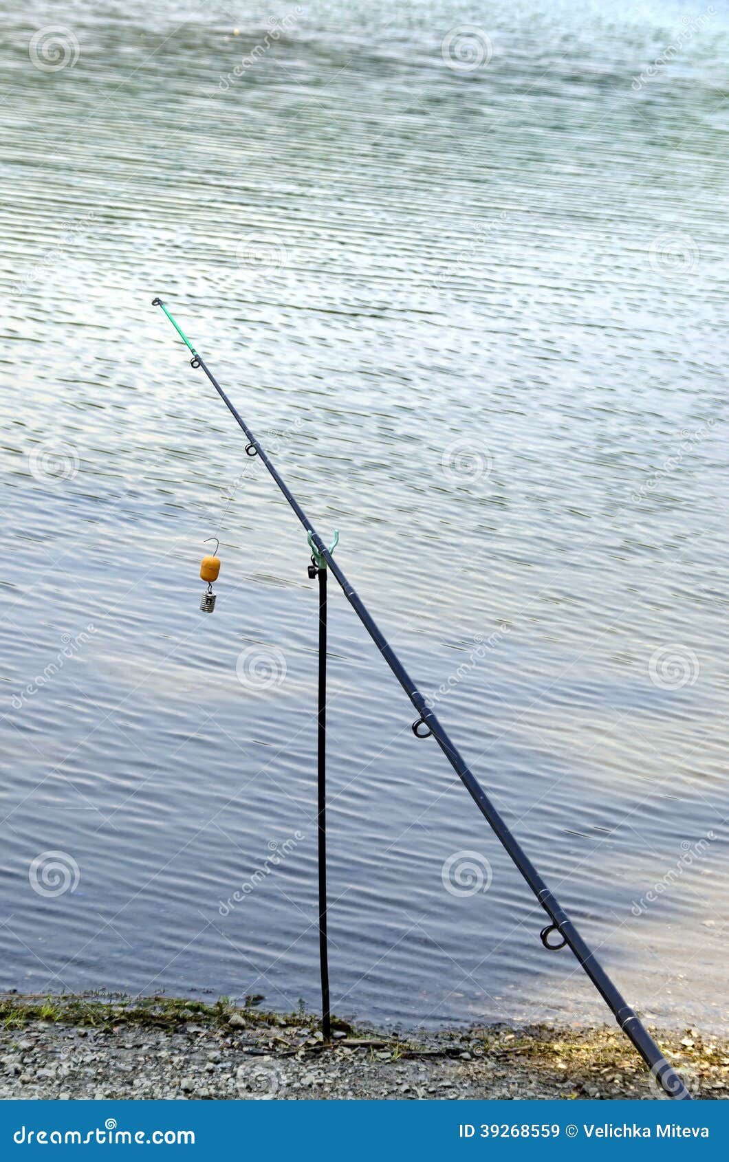 A long fishing rod stock image. Image of spool, leaning - 39268559