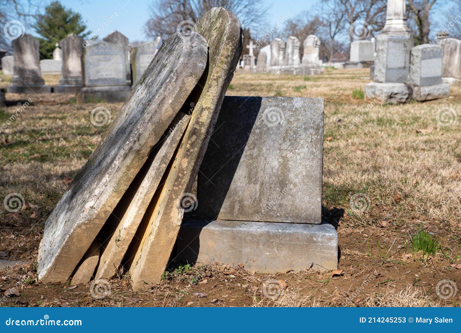 A Stack of Broken Tombstones in a Cemetery Stock Image - Image of ...