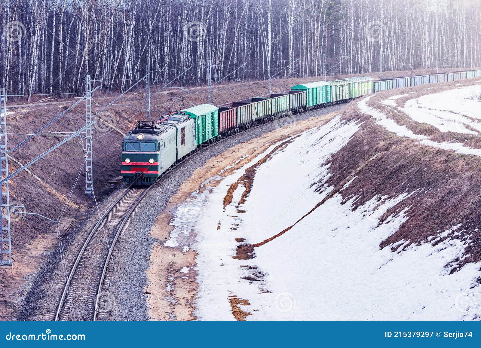 Long Freight Train Approaches. Stock Image - Image of snow, morning ...