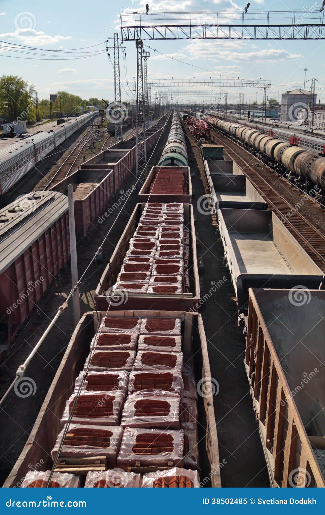 Long Freight Trains with Bricks and Sand at Railways Stock Image ...