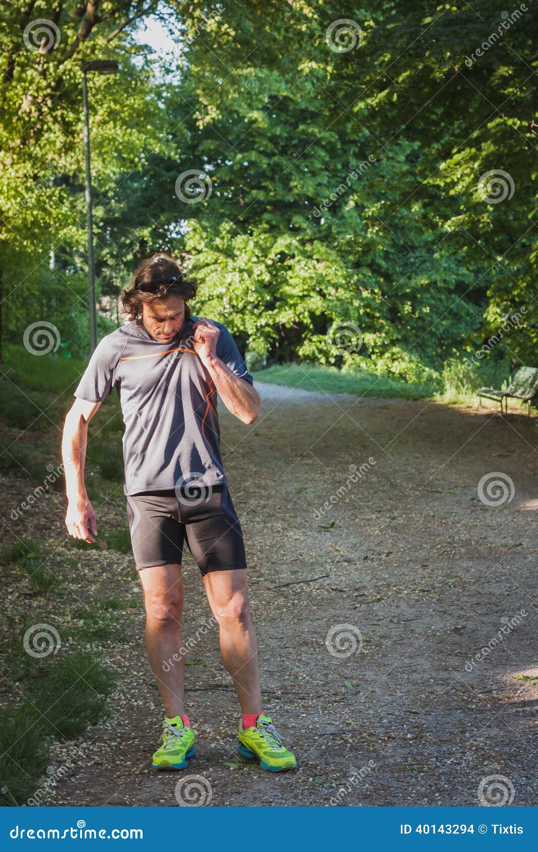Long Haired Athlete Running in a City Park Stock Photo - Image of ...