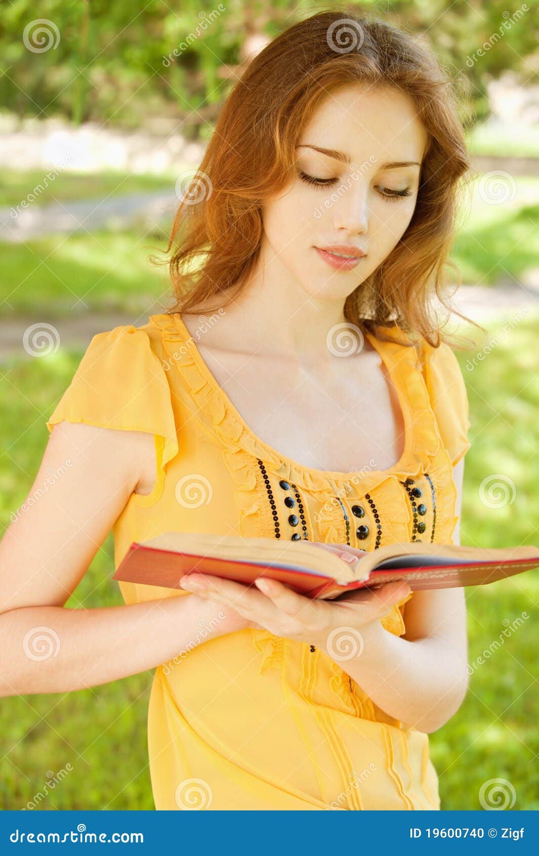 Long-haired Girl Reads Book Stock Photo - Image of joyful, head: 19600740