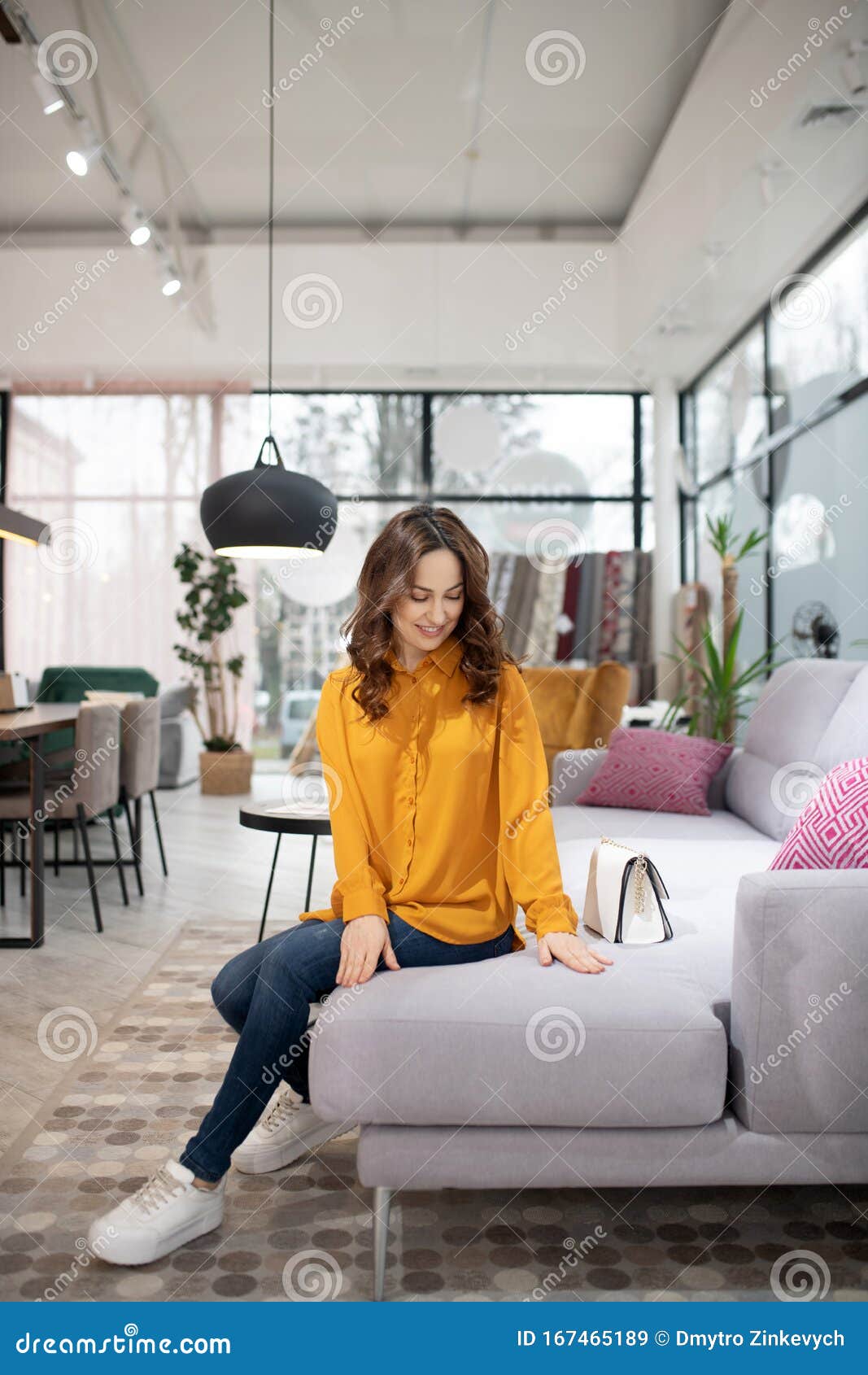 Long Haired Pretty Woman Sitting On The Cosy Sofa Stock Image Image