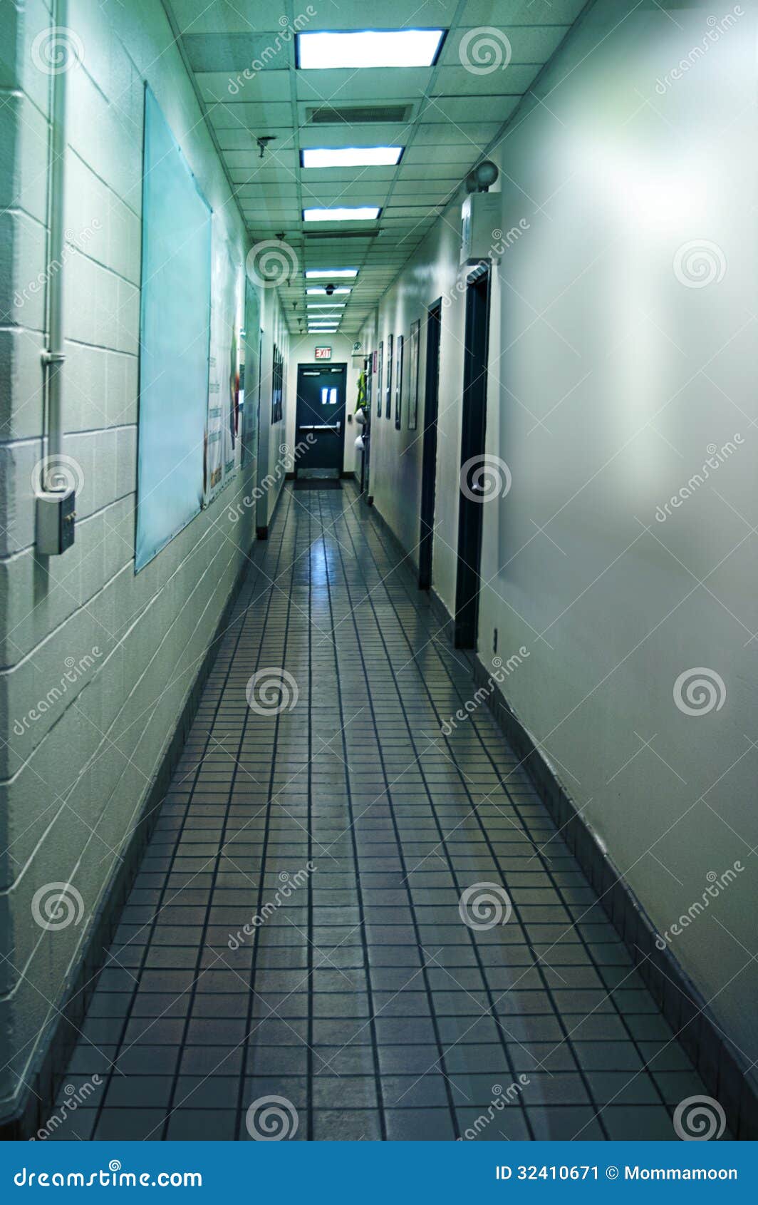 Long Hallway Leading To Exit Stock Image - Image of space, stone: 32410671