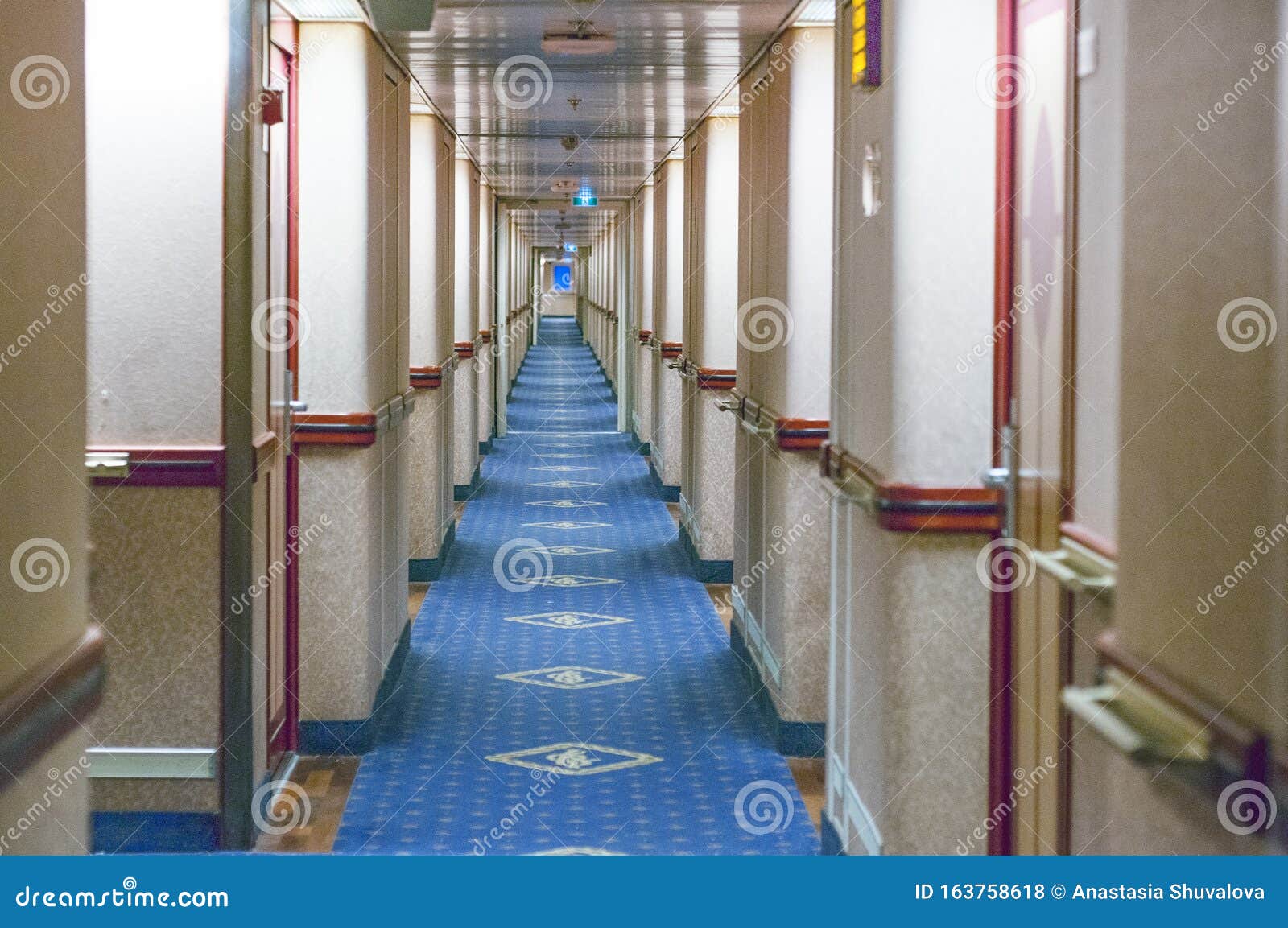 Long Hallway on the Ship. Rows of Cabin Doors. Long Corridor Leading To ...