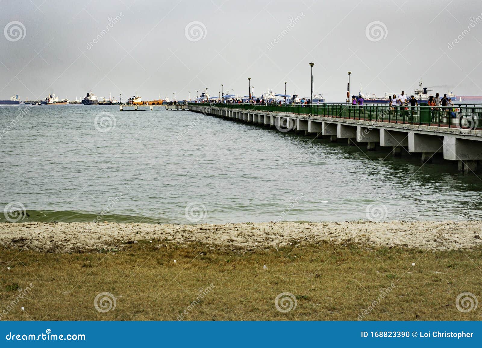 Long jetty at the beach stock photo. Image of jetty - 168823390