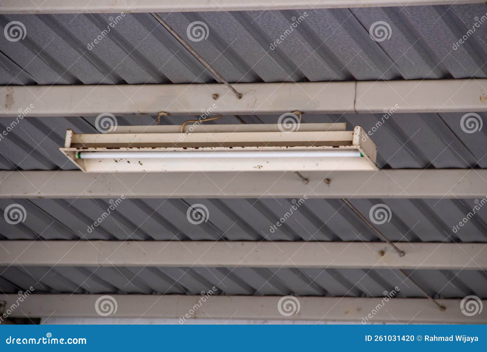 The Long Lamp that is Attached Above the Terrace is Made of Steel Frame ...