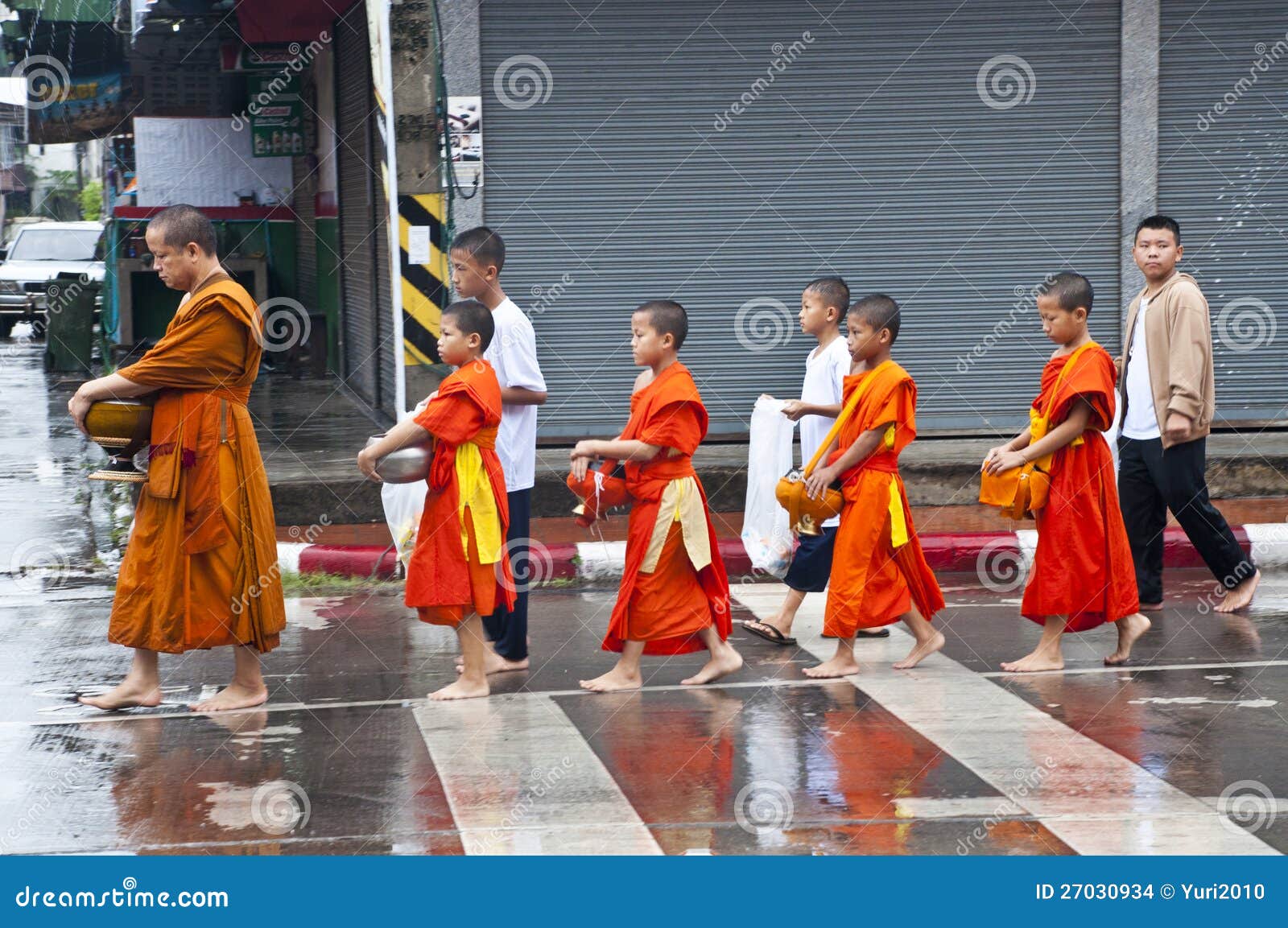 A Long Line of Monks Receiving Rice Offering from Editorial Stock Image ...