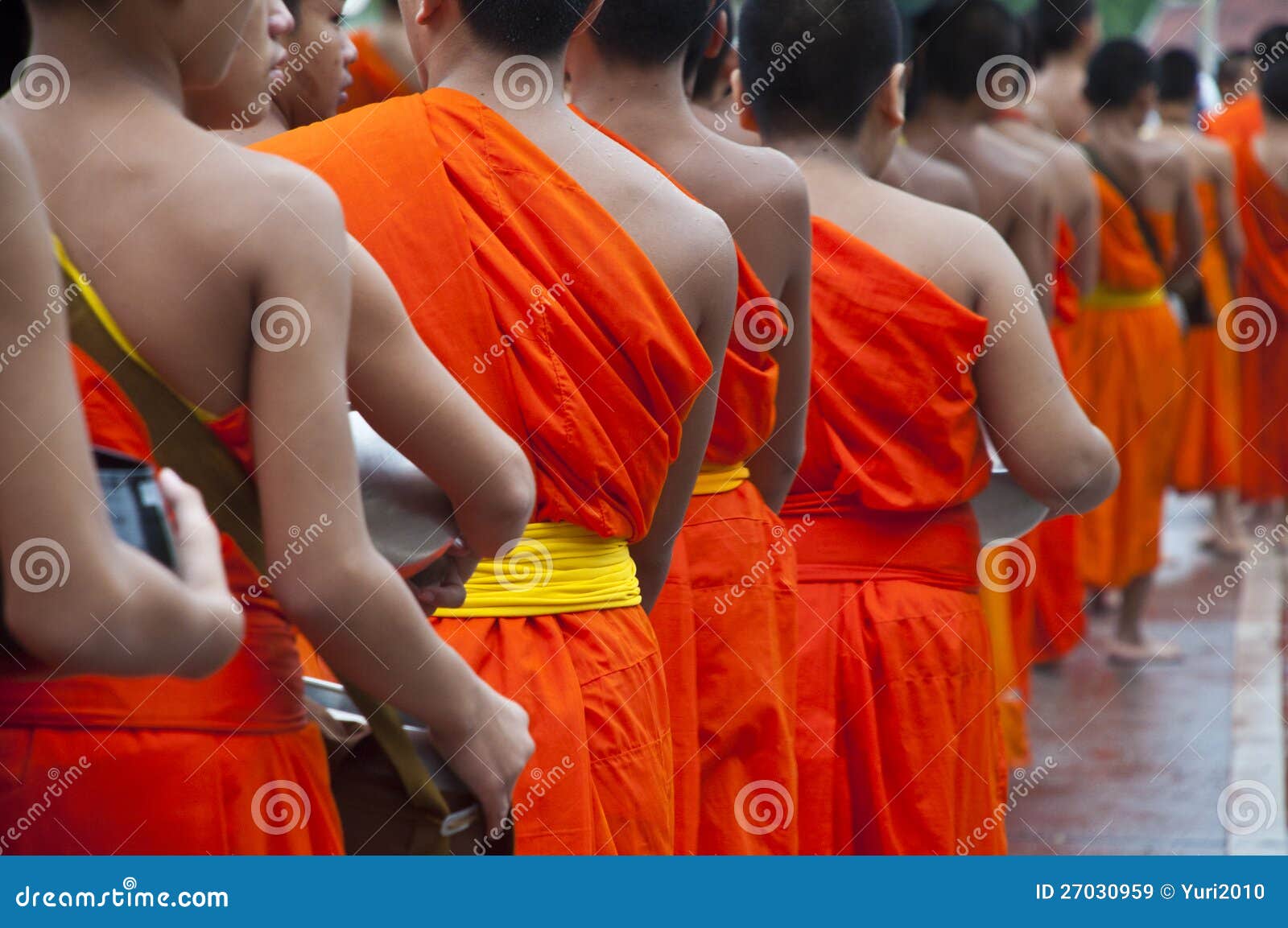 A Long Line of Monks Receiving Rice Offering from Editorial Stock Image ...