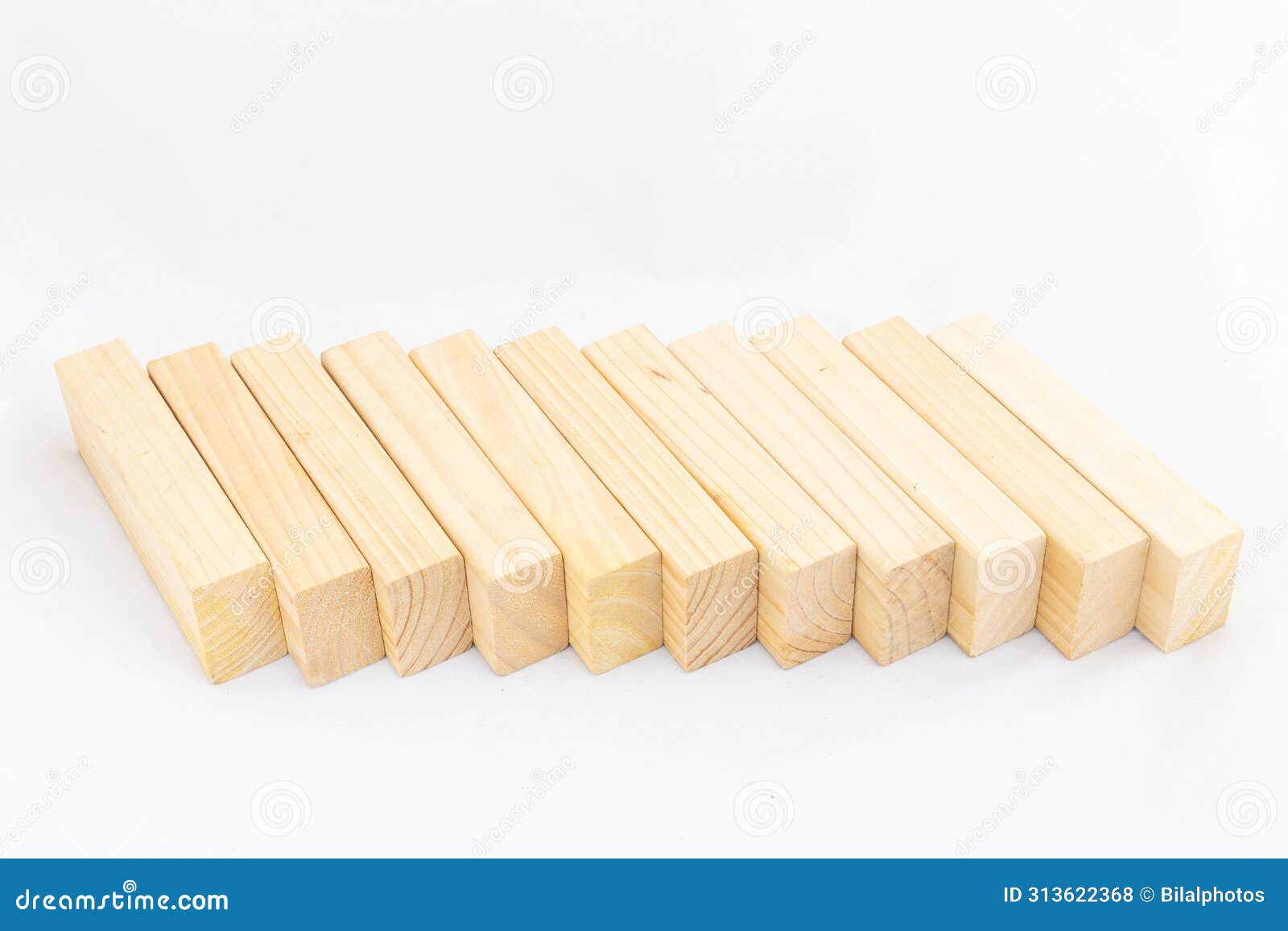 A Long Line of Wooden Uneven Rectangular Cubes Isolated on White ...