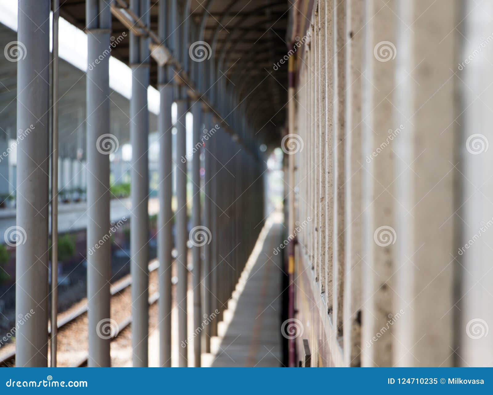 Long Lines of Pillars beside the Standing Train. Stock Image - Image of ...