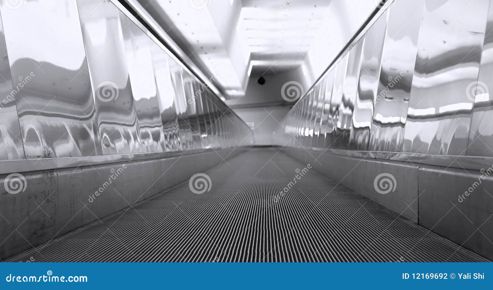 Long Moving Walkway stock photo. Image of reflection - 12169692