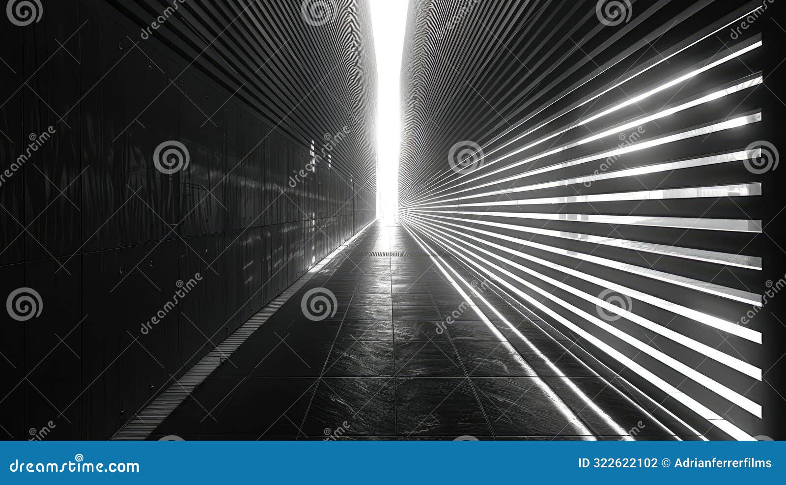 A Long, Narrow Hallway with a Light Shining Down on it Stock Photo ...