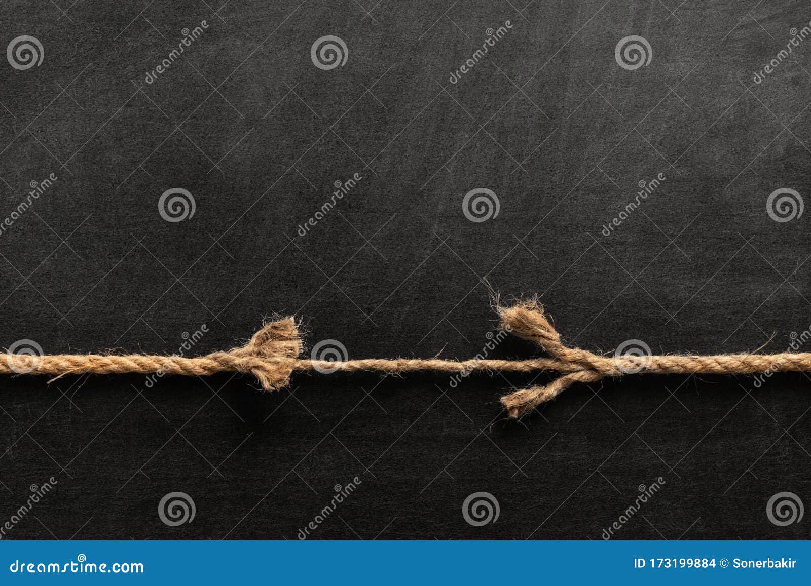 Long, Old Frayed Rope is Breaking Off. Isolated on Black. Stock Photo ...