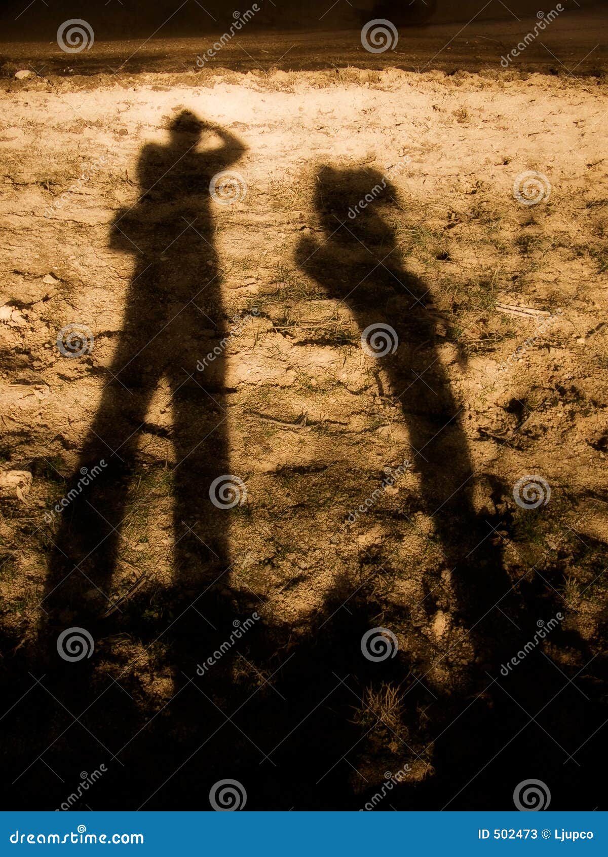 Long people shadows stock image. Image of sepia, long, beach - 502473