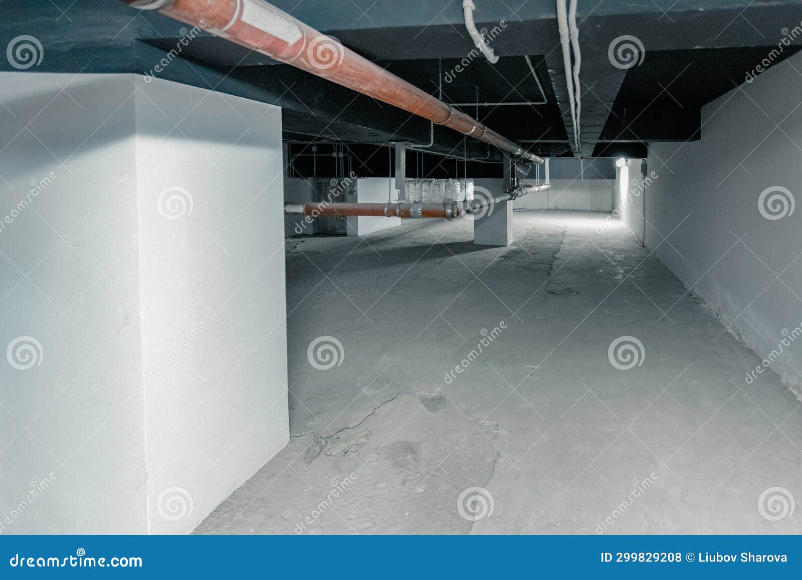 An Long Pipe in a Technical Room in the Basement of a Large Building ...