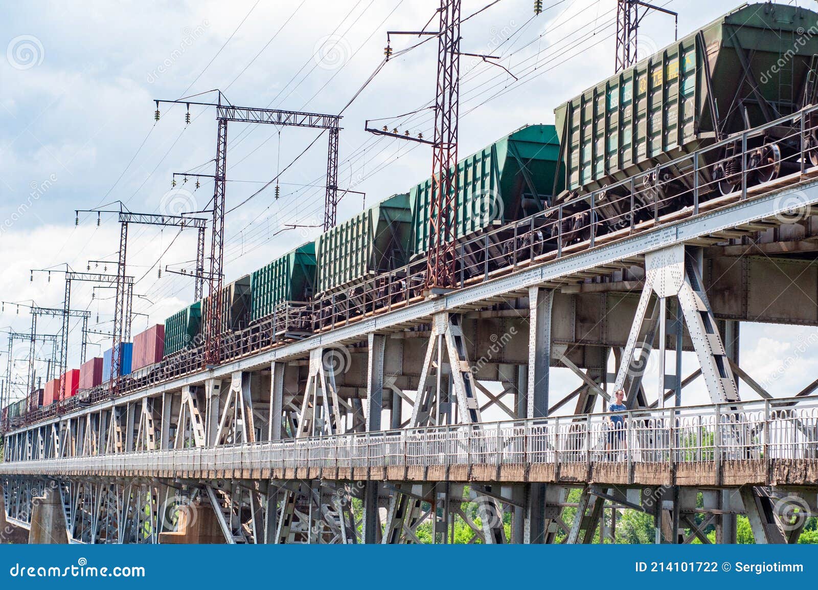 Long Railway Train on Iron Bridge Over River, Freight Wagons Stock ...