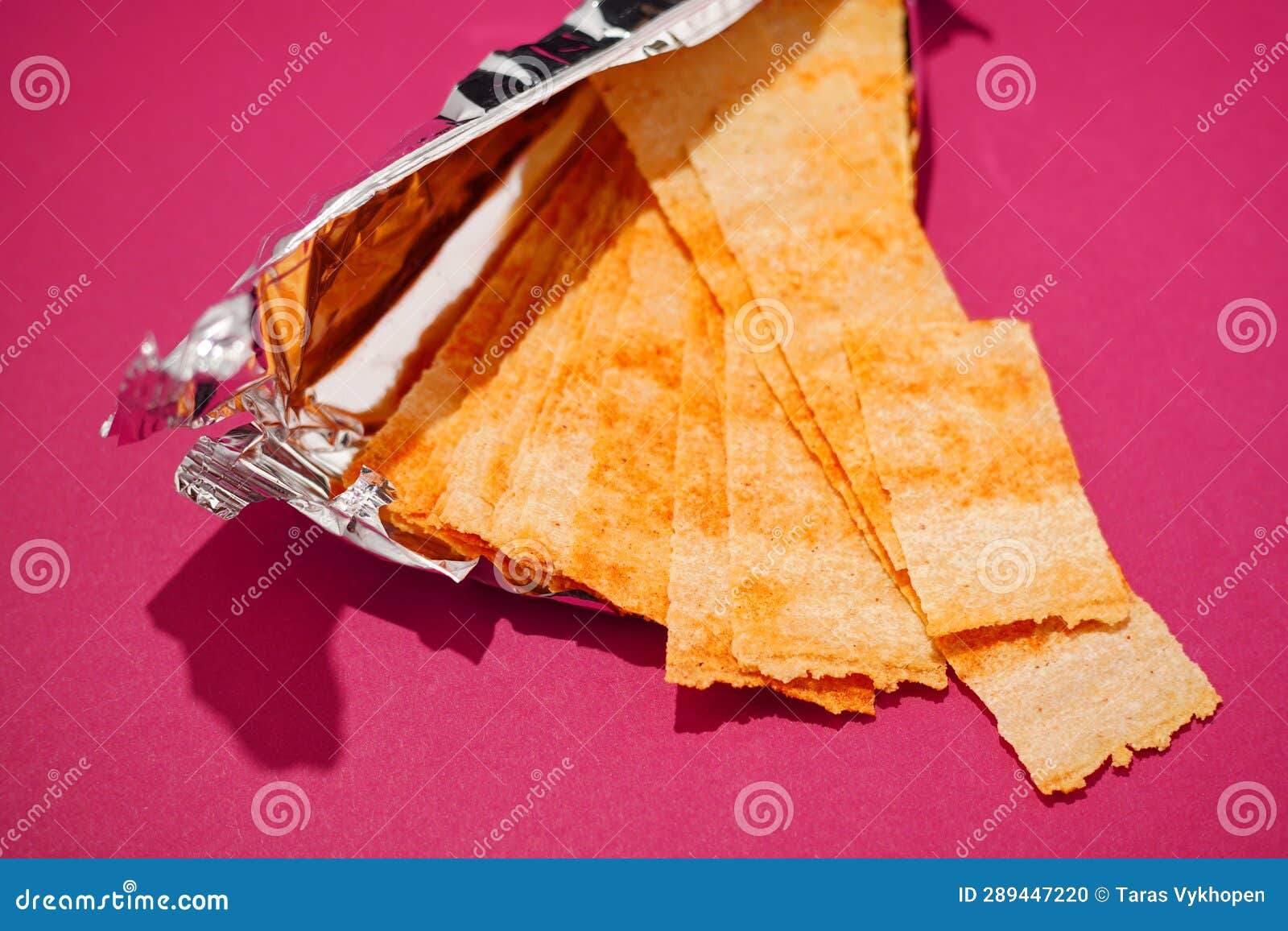 Long Rectangular Chips on a Bright Pink Background Stock Photo - Image ...