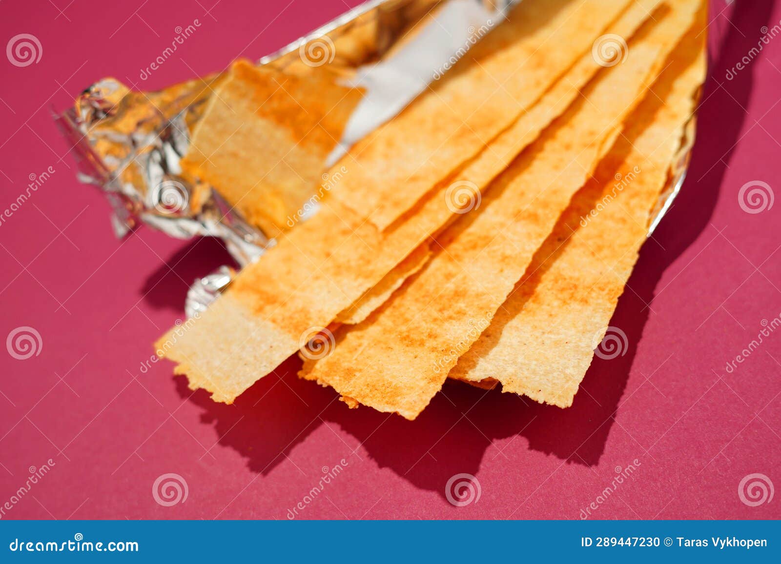 Long Rectangular Chips on a Bright Pink Background Stock Photo - Image ...