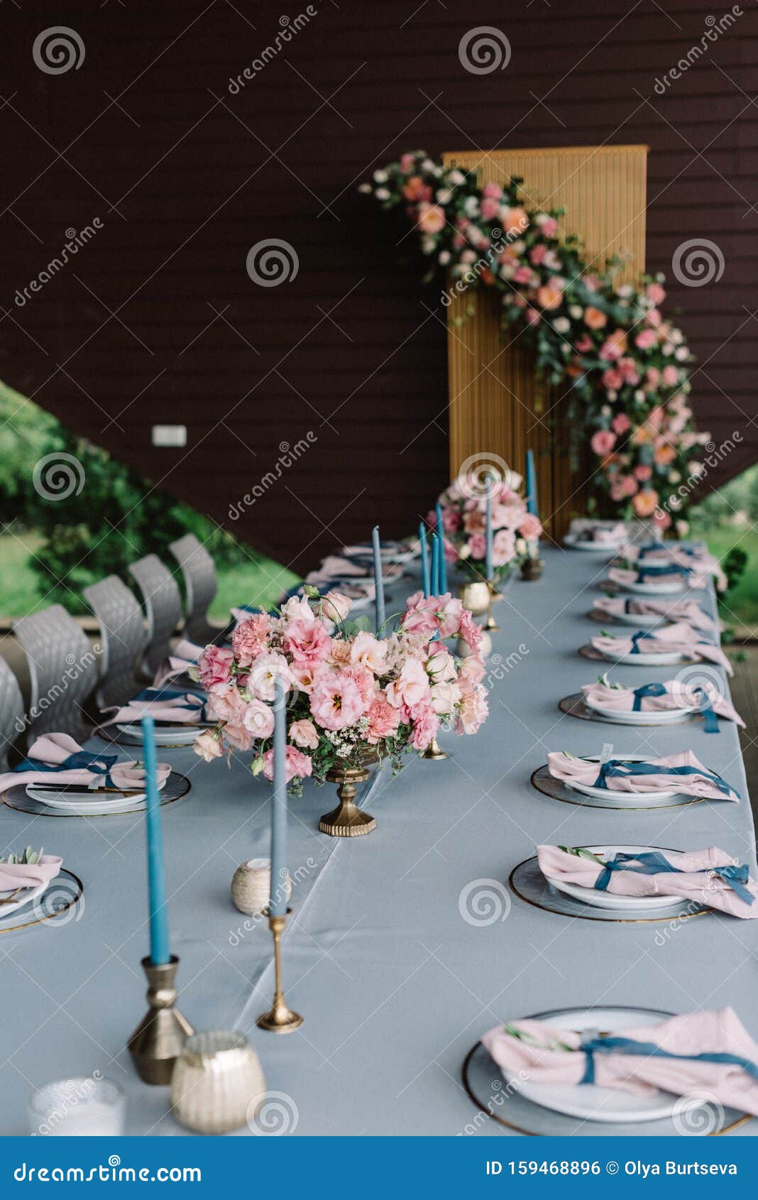Long Rectangular Wedding Table Decorated with Blue Tablecloth, Candles ...