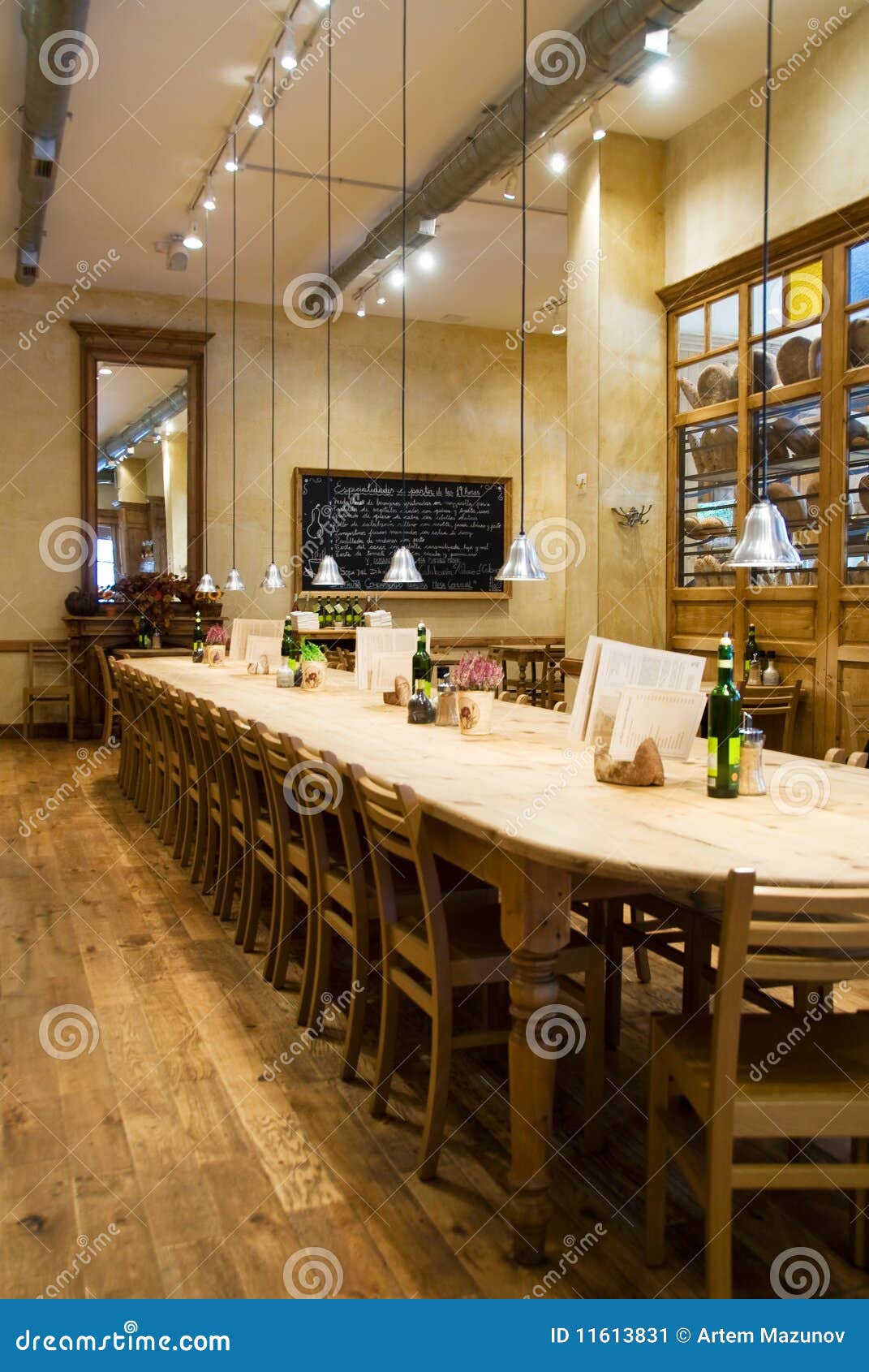 Long restaurant table stock image. Image of tissue, flowers - 11613831