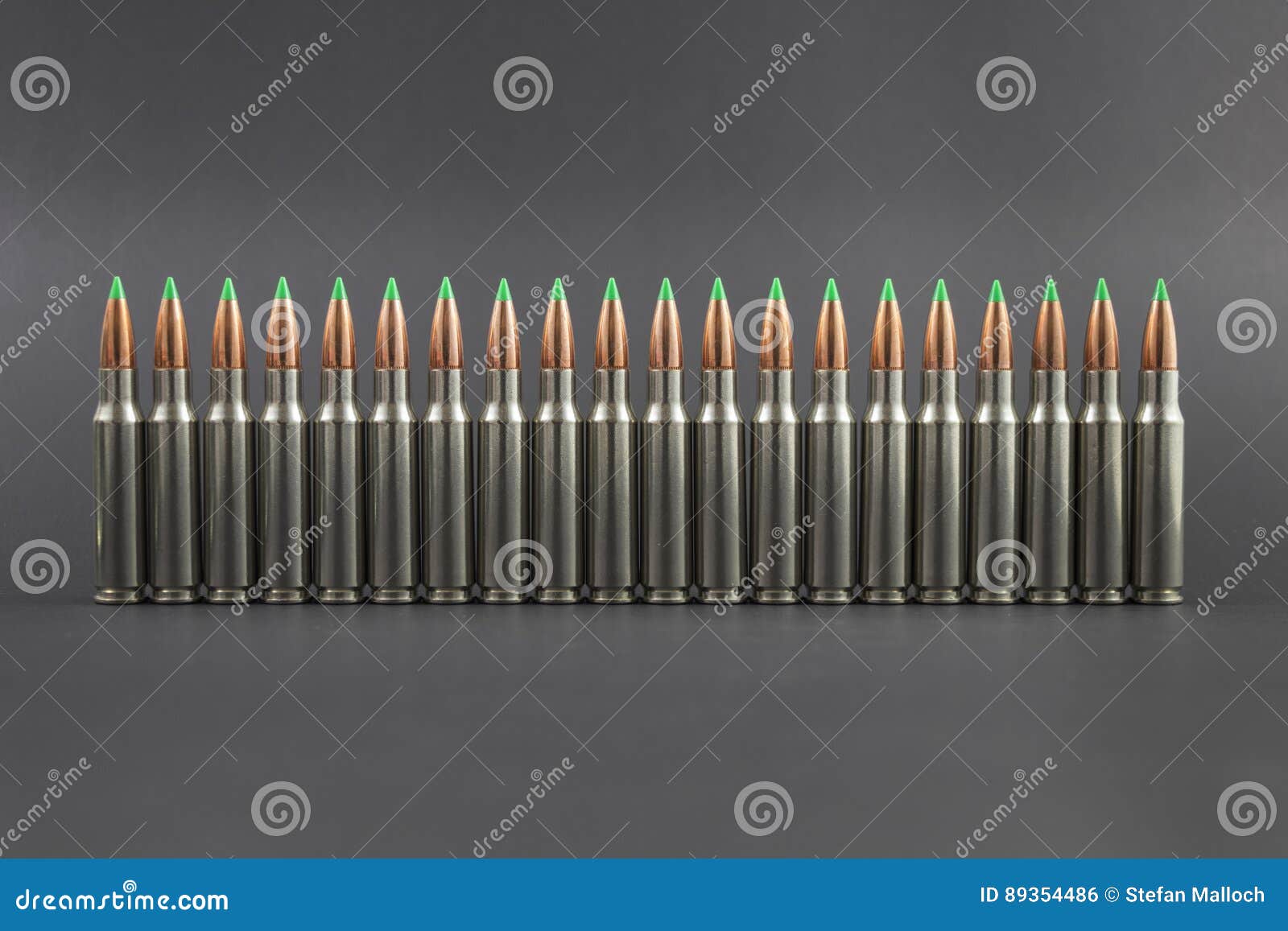 Long Rifle ammunition Row stock photo. Image of bullet - 89354486