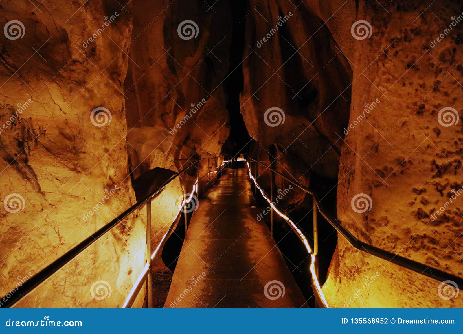 Long Road in a cave stock photo. Image of dark, caveroad - 135568952