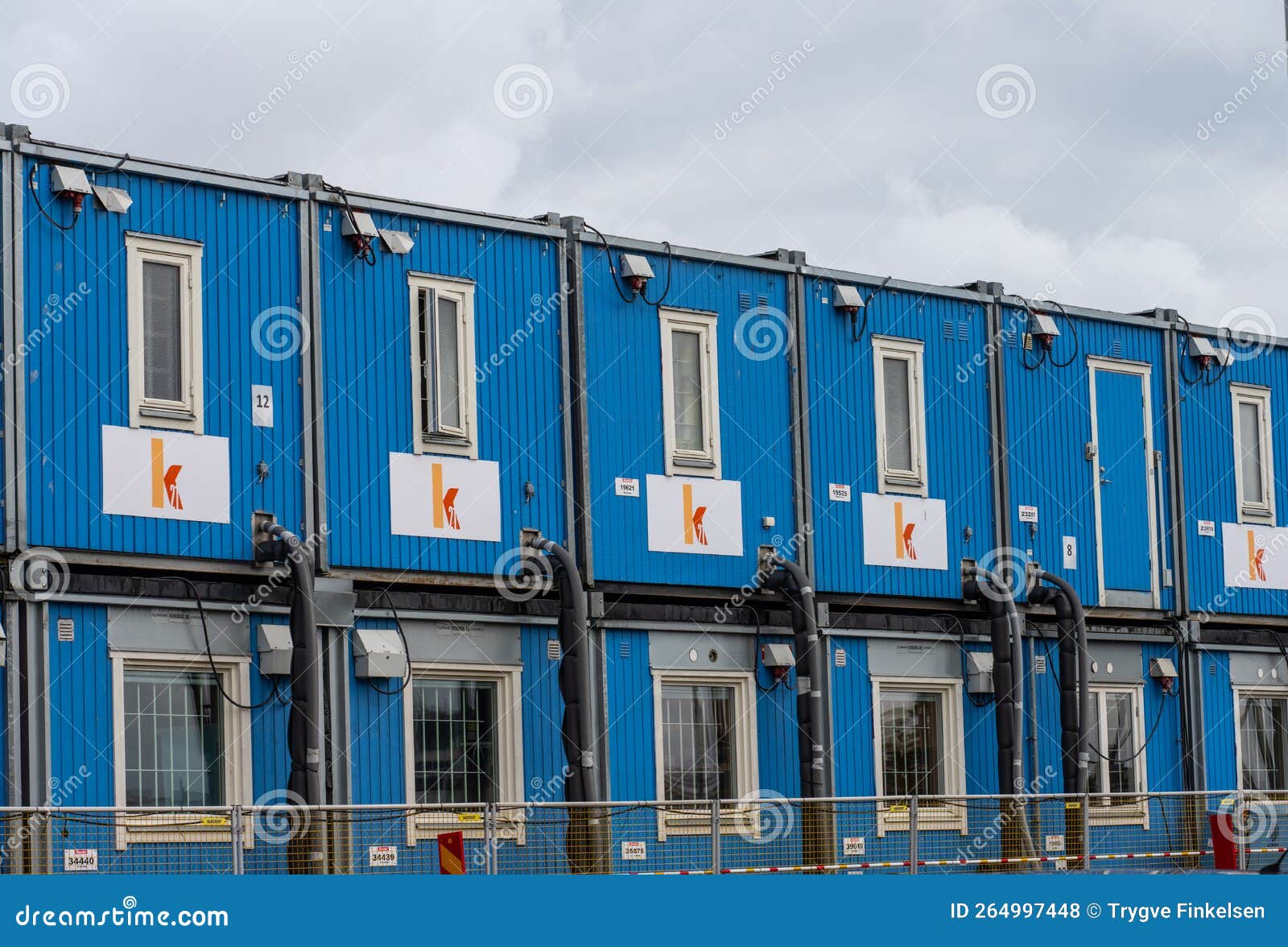 Long Row of Blue Barracks at a Construction Site.. Editorial Stock ...