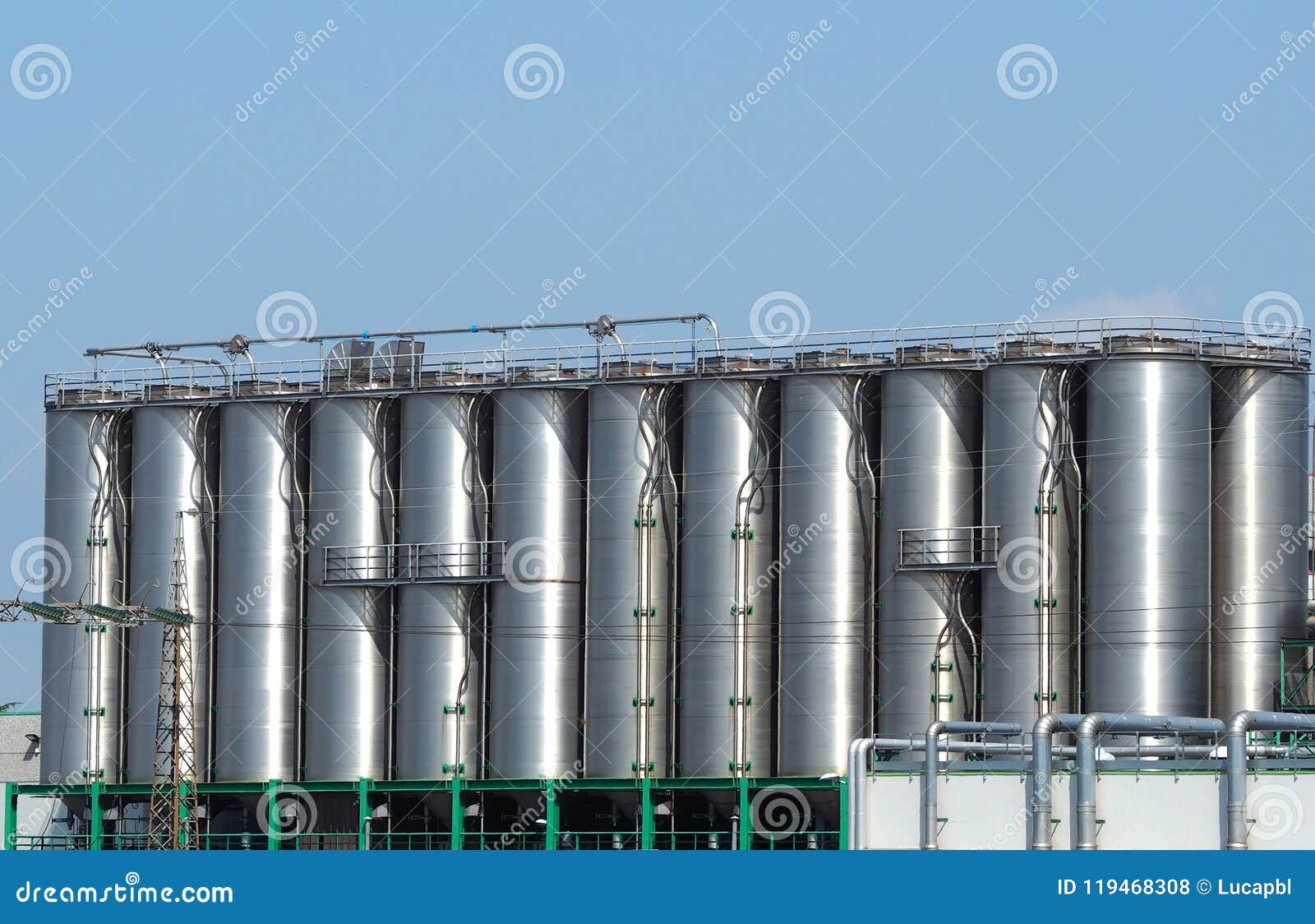 Long Row of Stainless Storage Silos for Liquids and Differents Types of ...