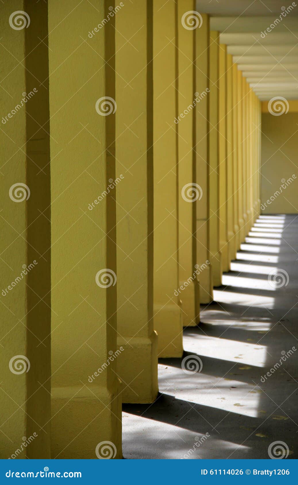 Long row of yellow columns stock photo. Image of yellow - 61114026