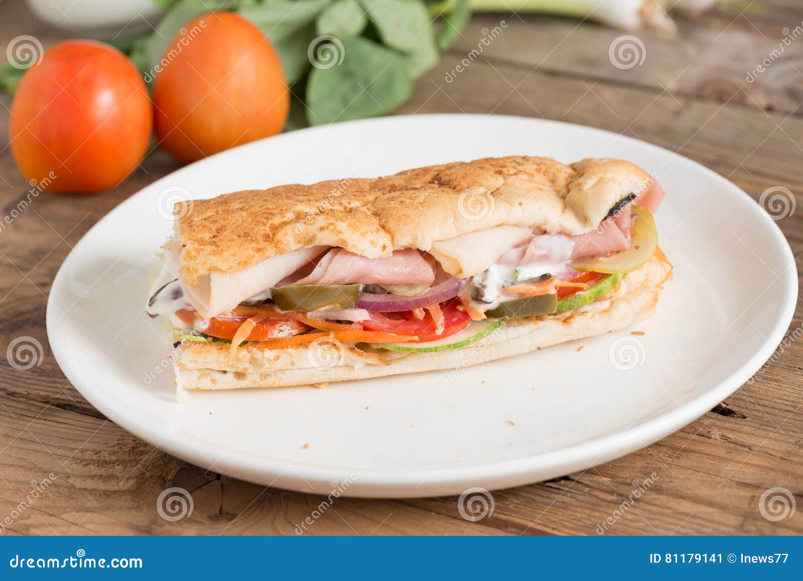 Long Sandwich with Ham, Cheese, Tomatoes, Red Onion and Lettuce. Stock ...