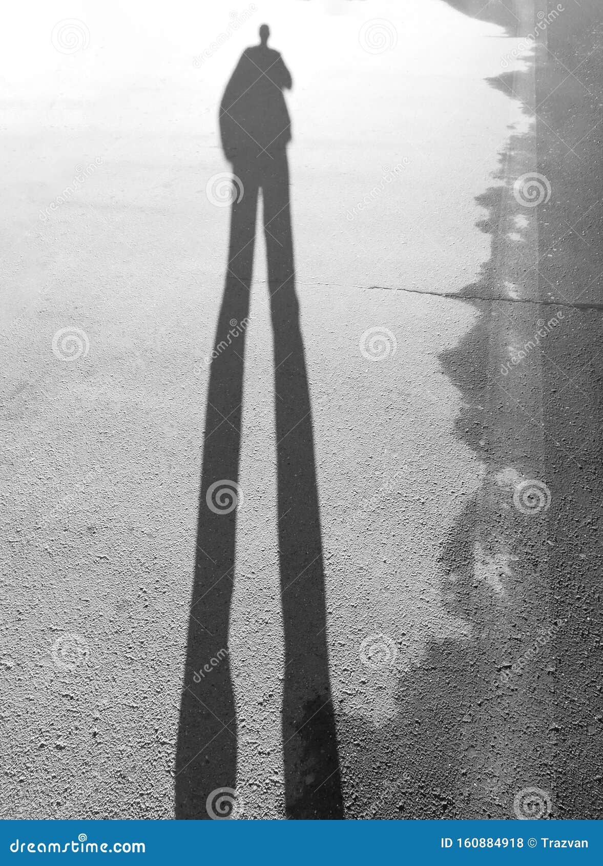 Long Shadow of a Man Standing in the Sunset Stock Photo - Image of city ...