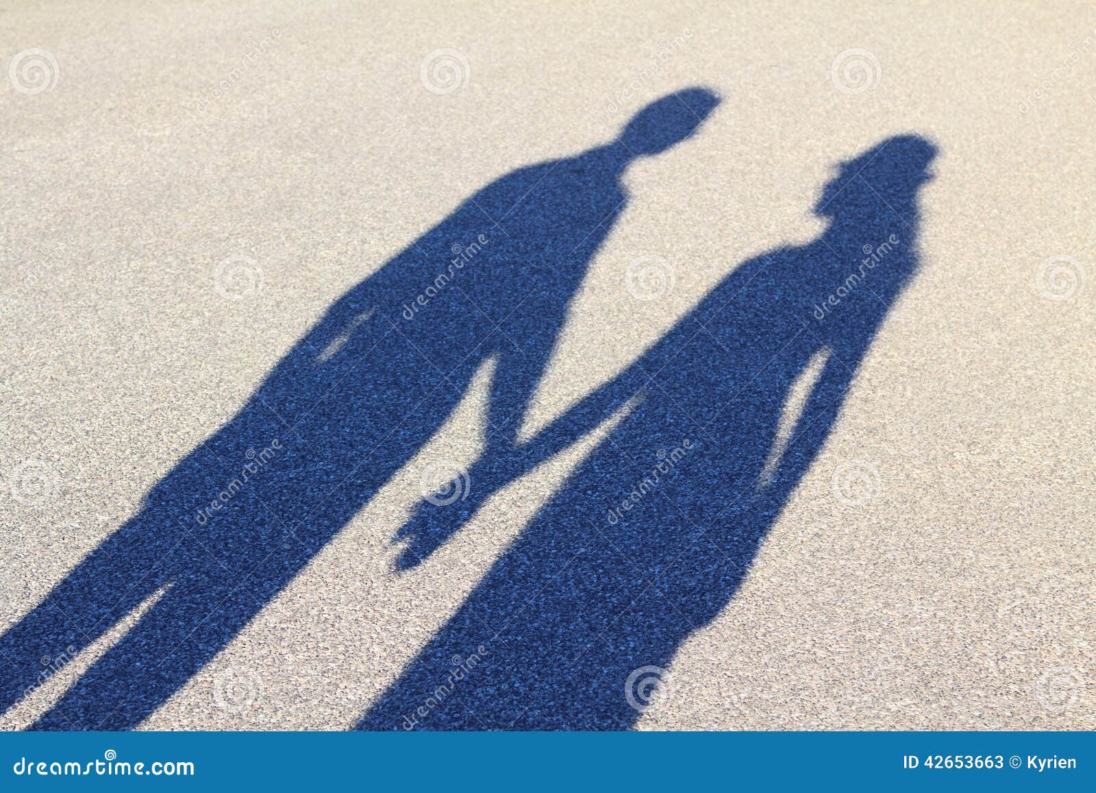 Long shadow of two lovers stock image. Image of engagement - 42653663