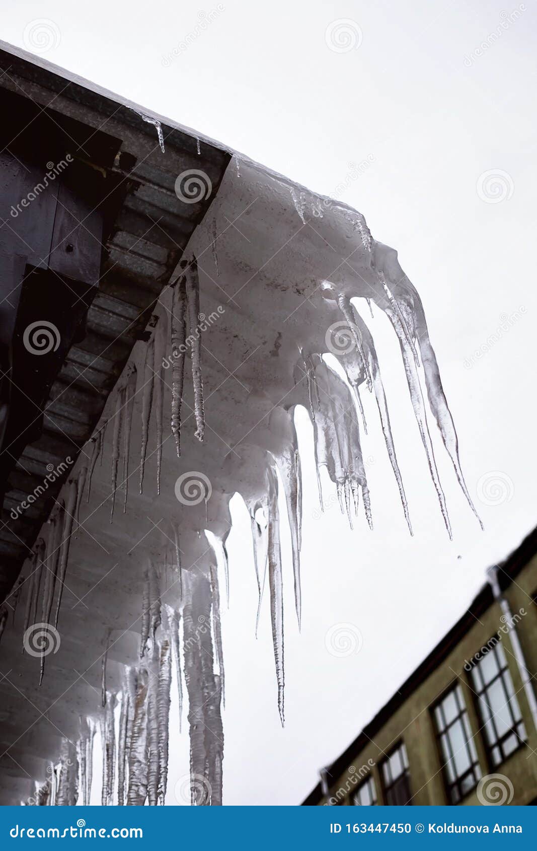 Long and Sharp Icicles on the Roof. Stock Photo - Image of frozen ...